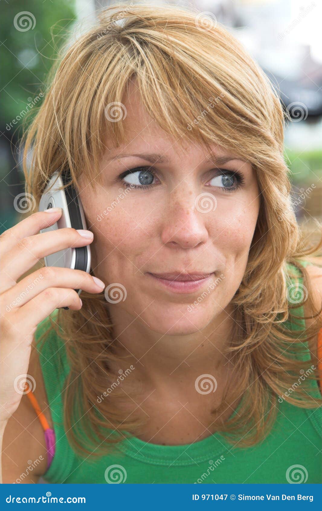 Listening to the phone stock image. Image of blond, listen - 971047