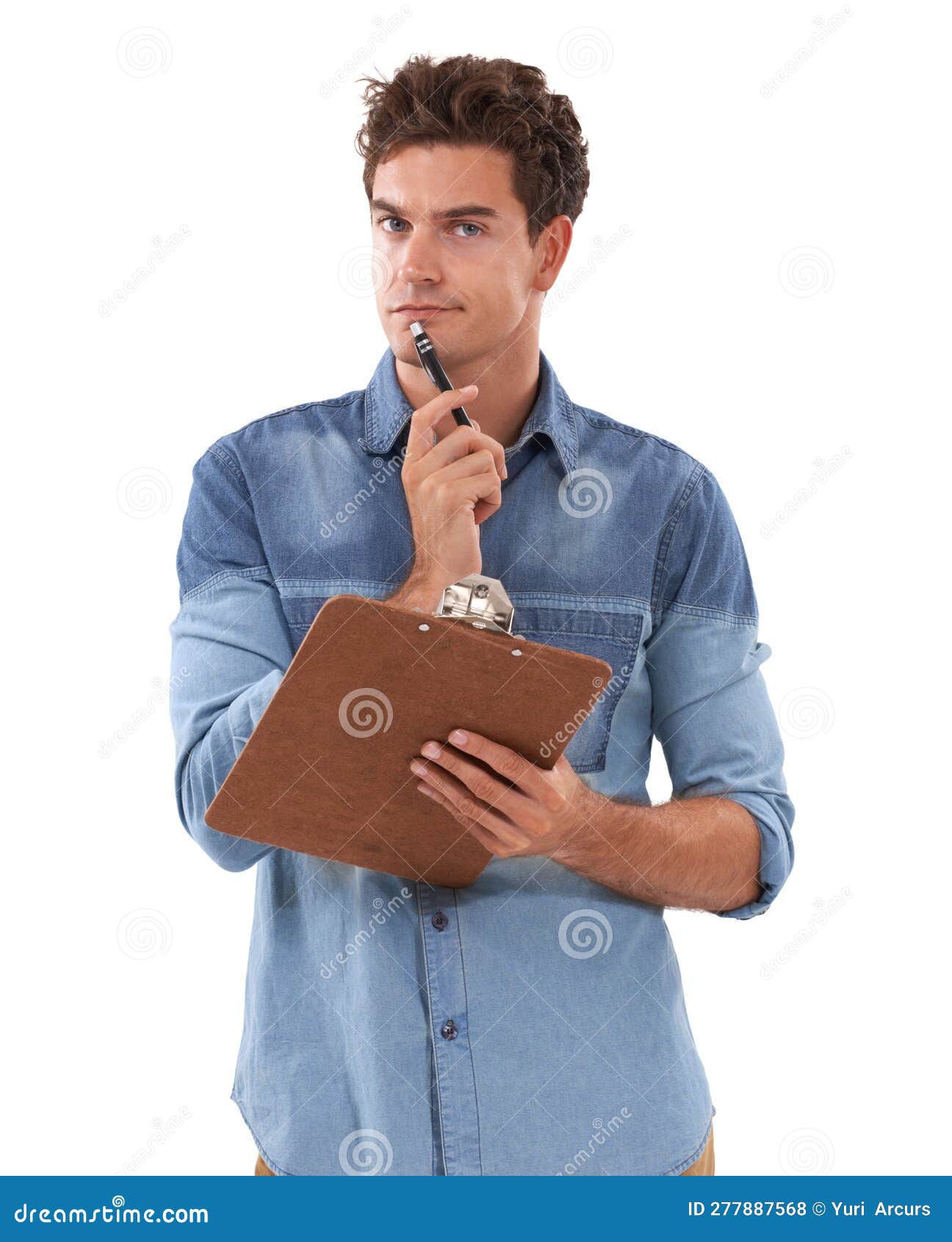 Lists Make Everything Easier. a Pensive Young Man Holding a Clipboard ...