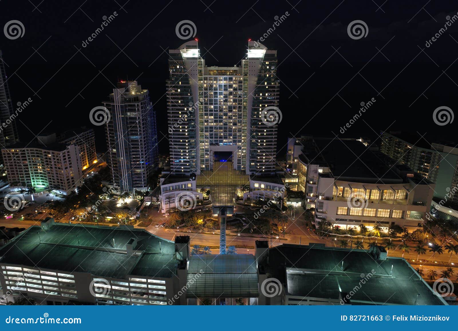 Lit buildings at night stock image. Image of lights, long - 82721663
