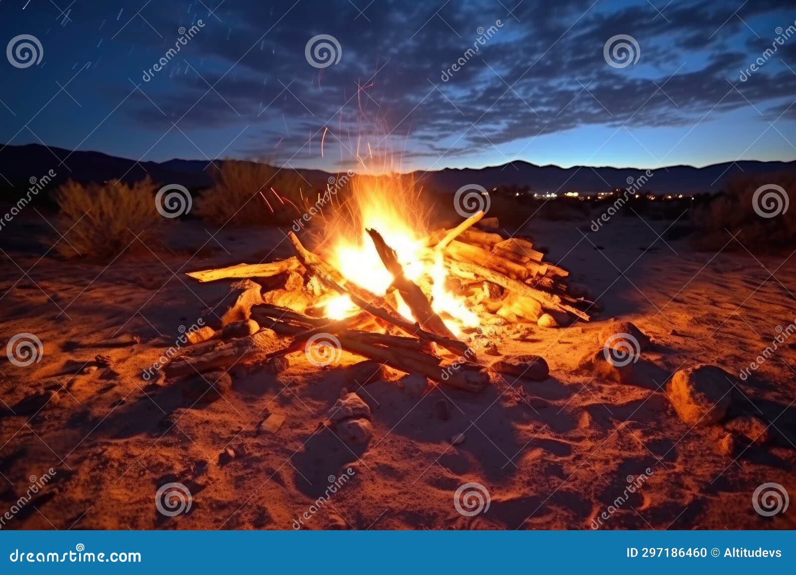 A Lit Campfire with Glowing Embers in the Desert Night Stock Photo ...