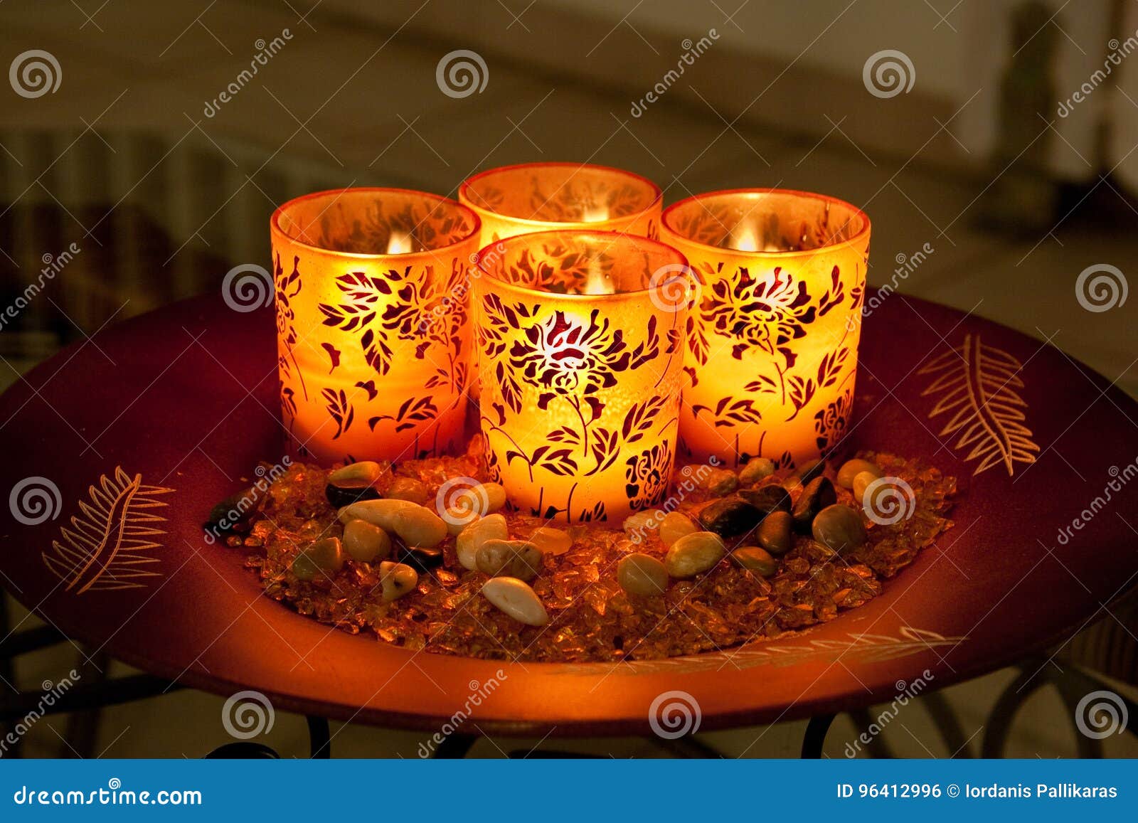 Lit Candles in Decorated Glasses on Plate- Side View Stock Photo ...