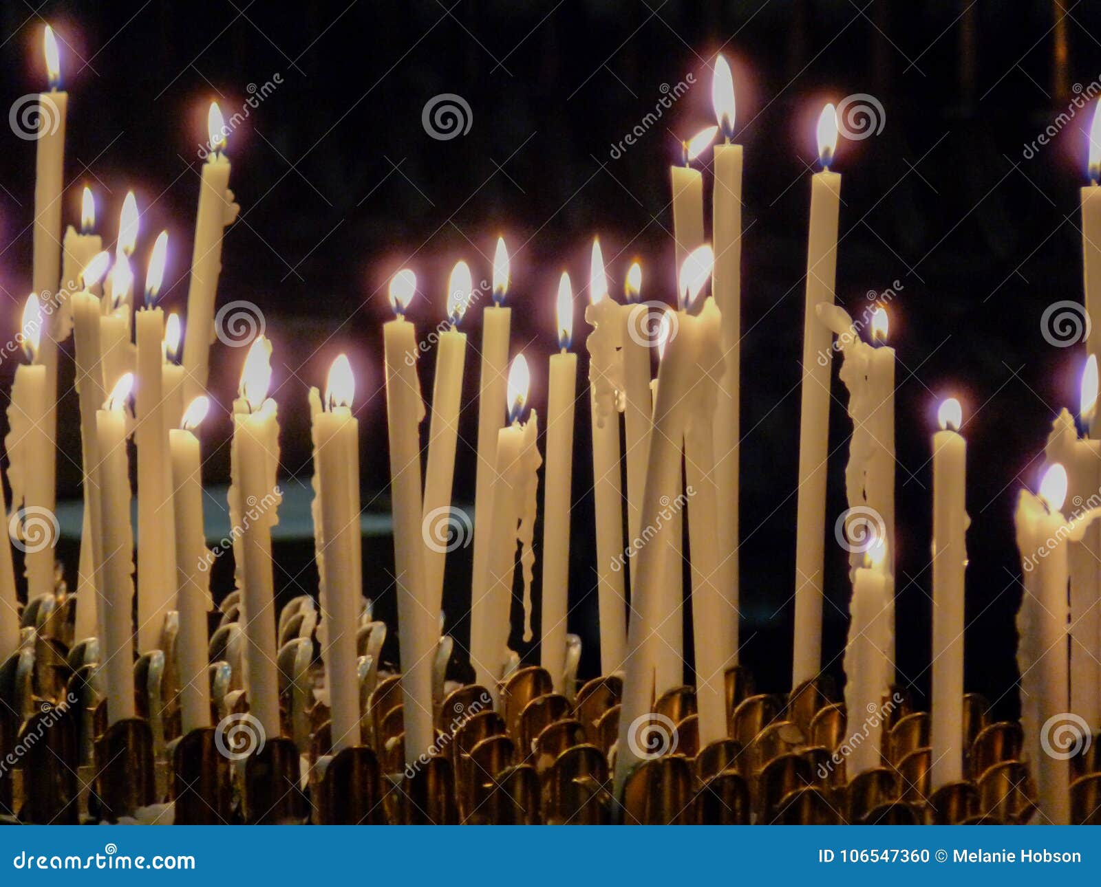 Lit Candles stock photo. Image of candle, cathedral - 106547360
