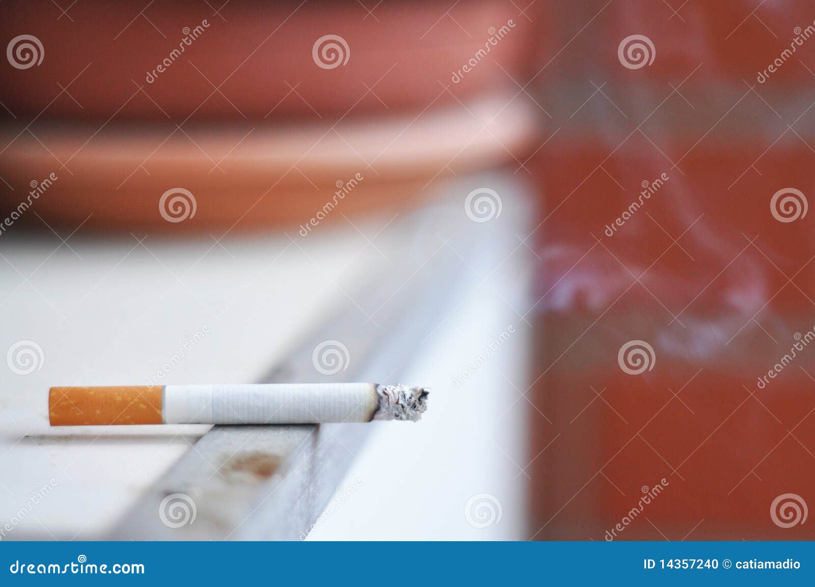 Lit Cigarette Stock Photo - Image: 14357240