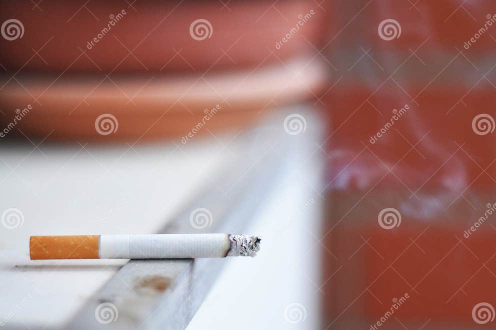 Lit cigarette stock photo. Image of burning, stress, cigarette - 14357240