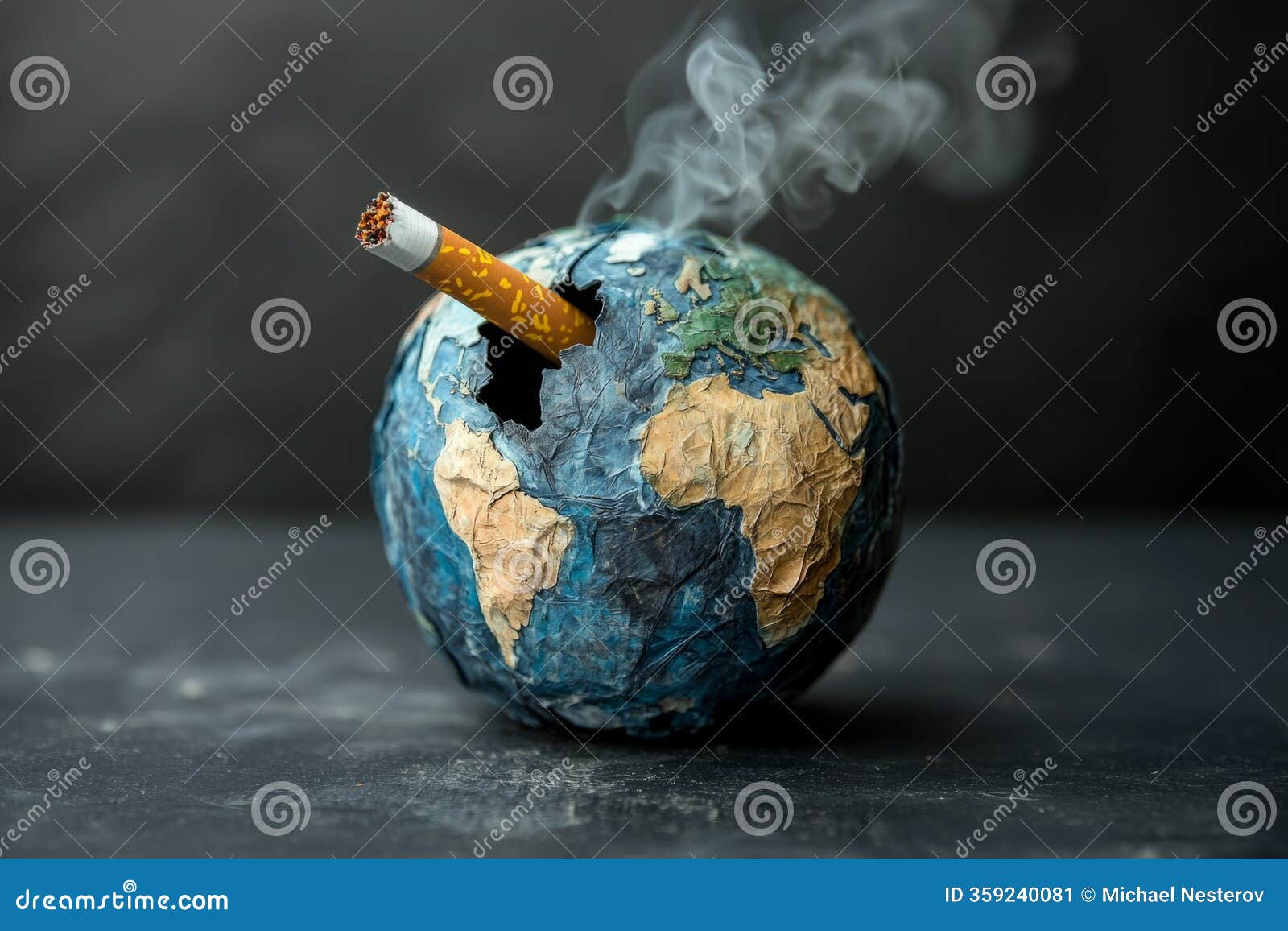Lit Cigarette Stuck in Cracked Planet Earth Model is Creating Smoke and ...