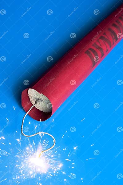 Lit Dynamite Stick on a Blue Background Stock Photo - Image of weapon ...