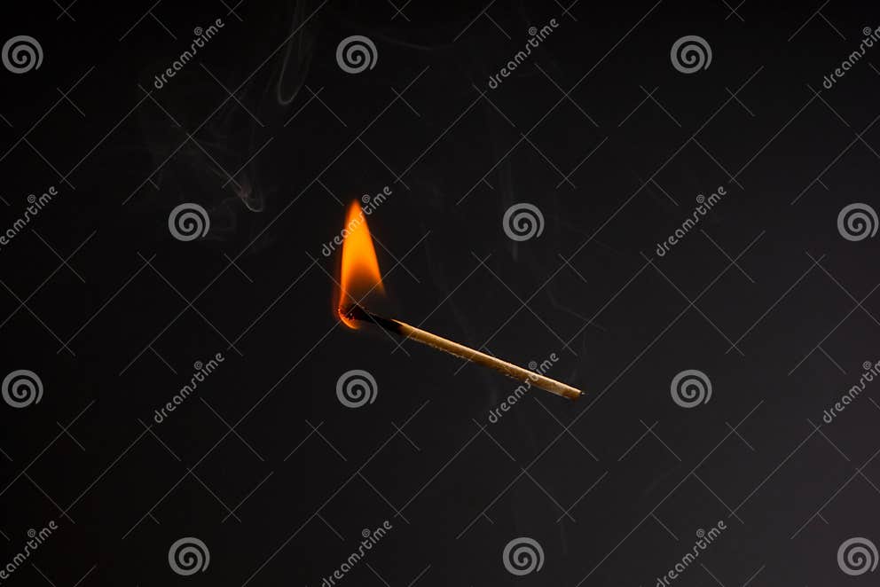 Lit Falling Match on a Black Background Stock Photo - Image of dark ...