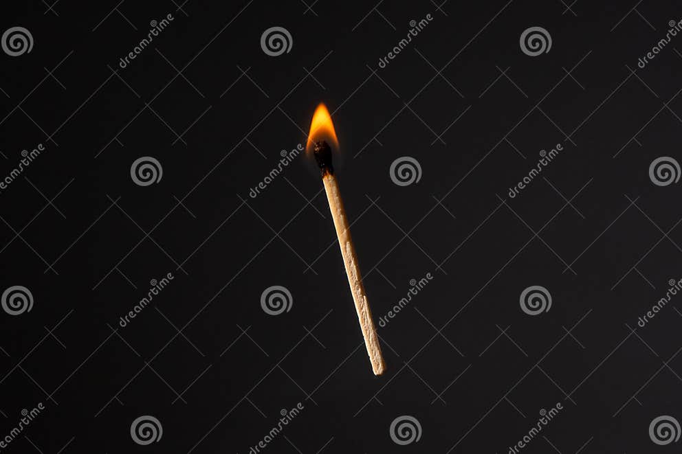 Lit Falling Match on a Black Background Stock Image - Image of single ...