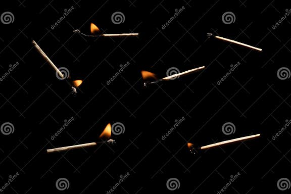 Lit Falling Match on a Black Background Stock Image - Image of ...