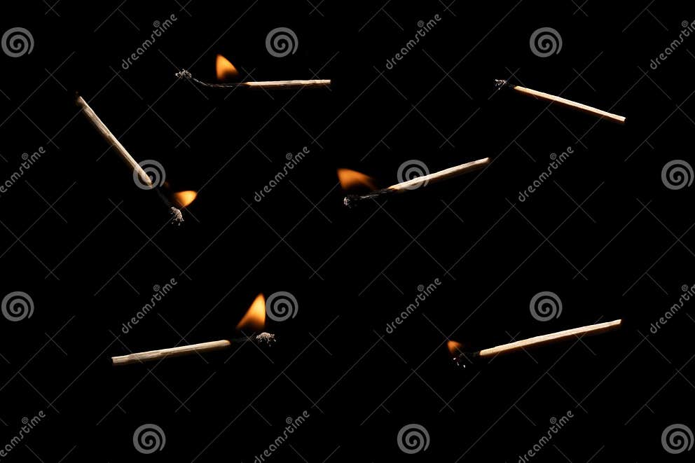 Lit Falling Match on a Black Background Stock Image - Image of ...