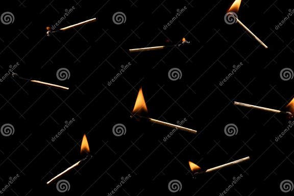 Lit Falling Match on a Black Background Stock Image - Image of ignite ...