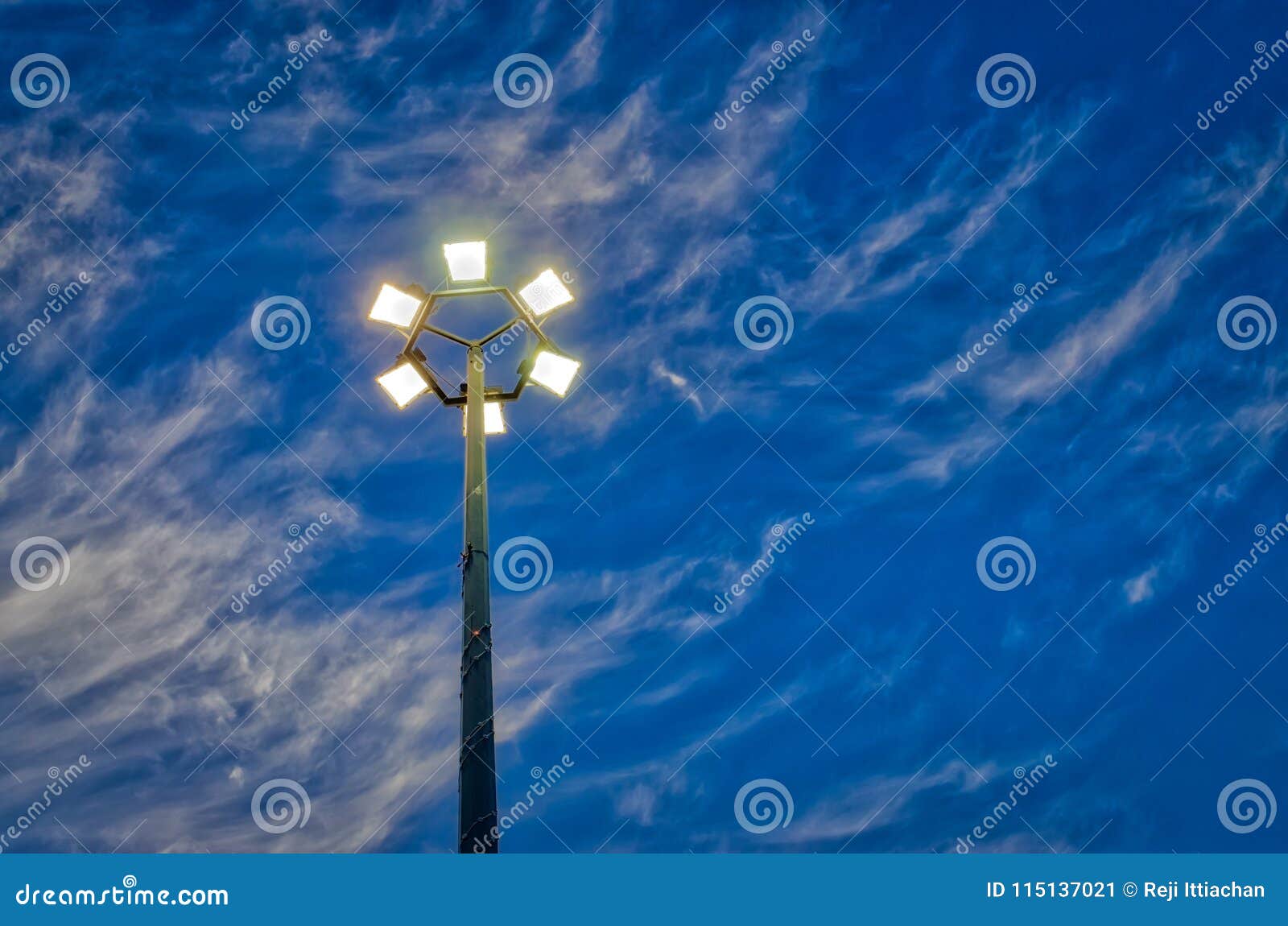 Lit Hexagonal Streetlight Under Dramatic Sky. Stock Image - Image of ...