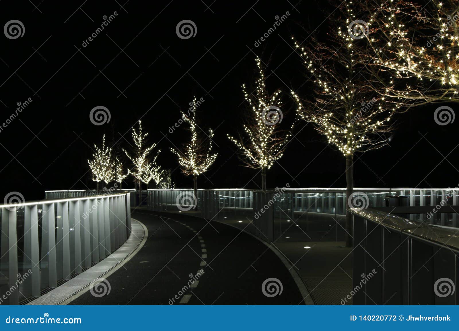 A Lit Pathway with Leading into Infinity Stock Photo - Image of ...
