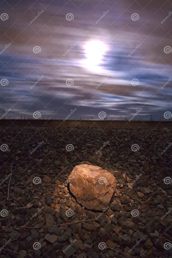 A Lit Rock at Night with a Full Moon Lighting the Stock Image - Image ...