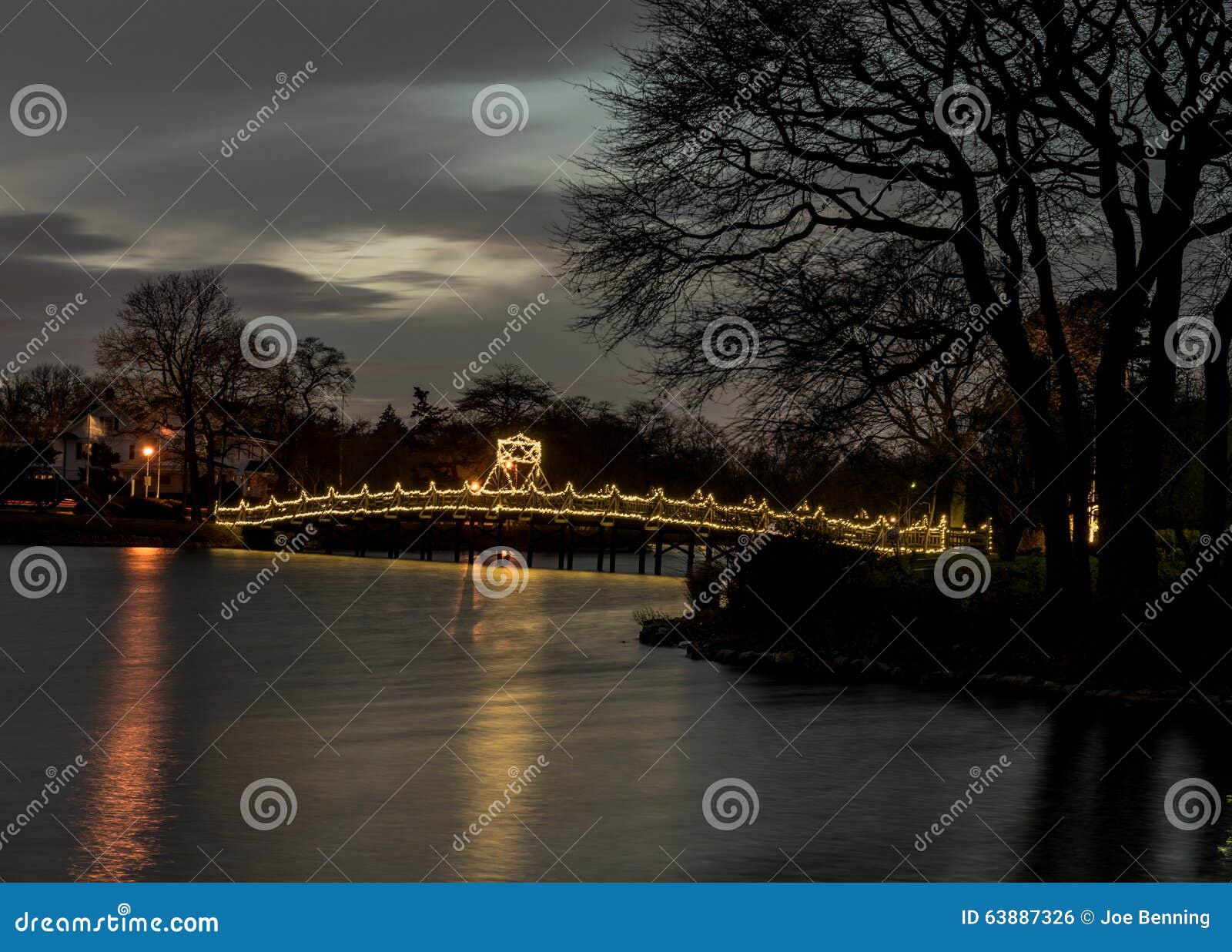 Lit up Bridge stock photo. Image of twilight, water, nightfall - 63887326
