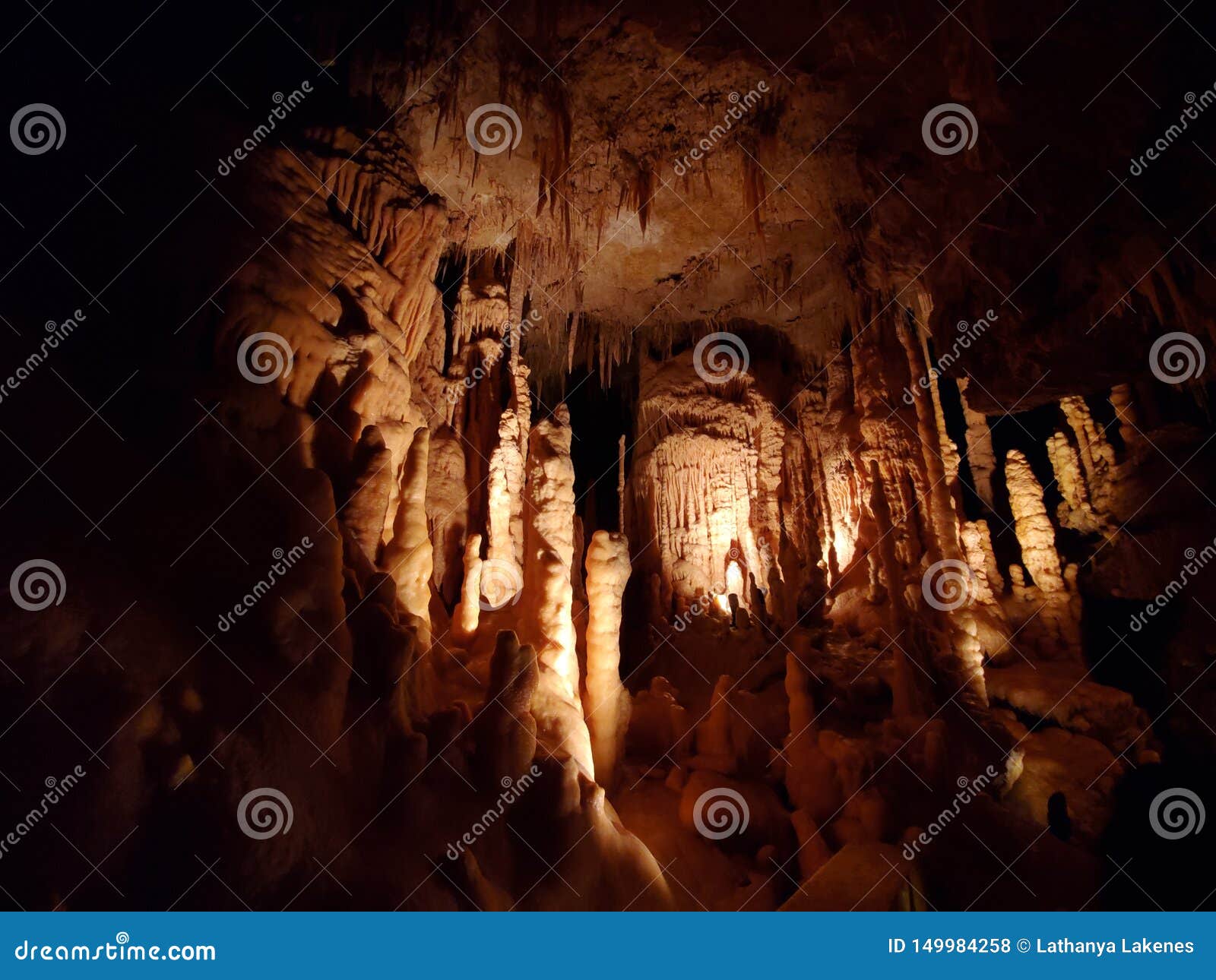 Lit up cave formations stock photo. Image of underground - 149984258