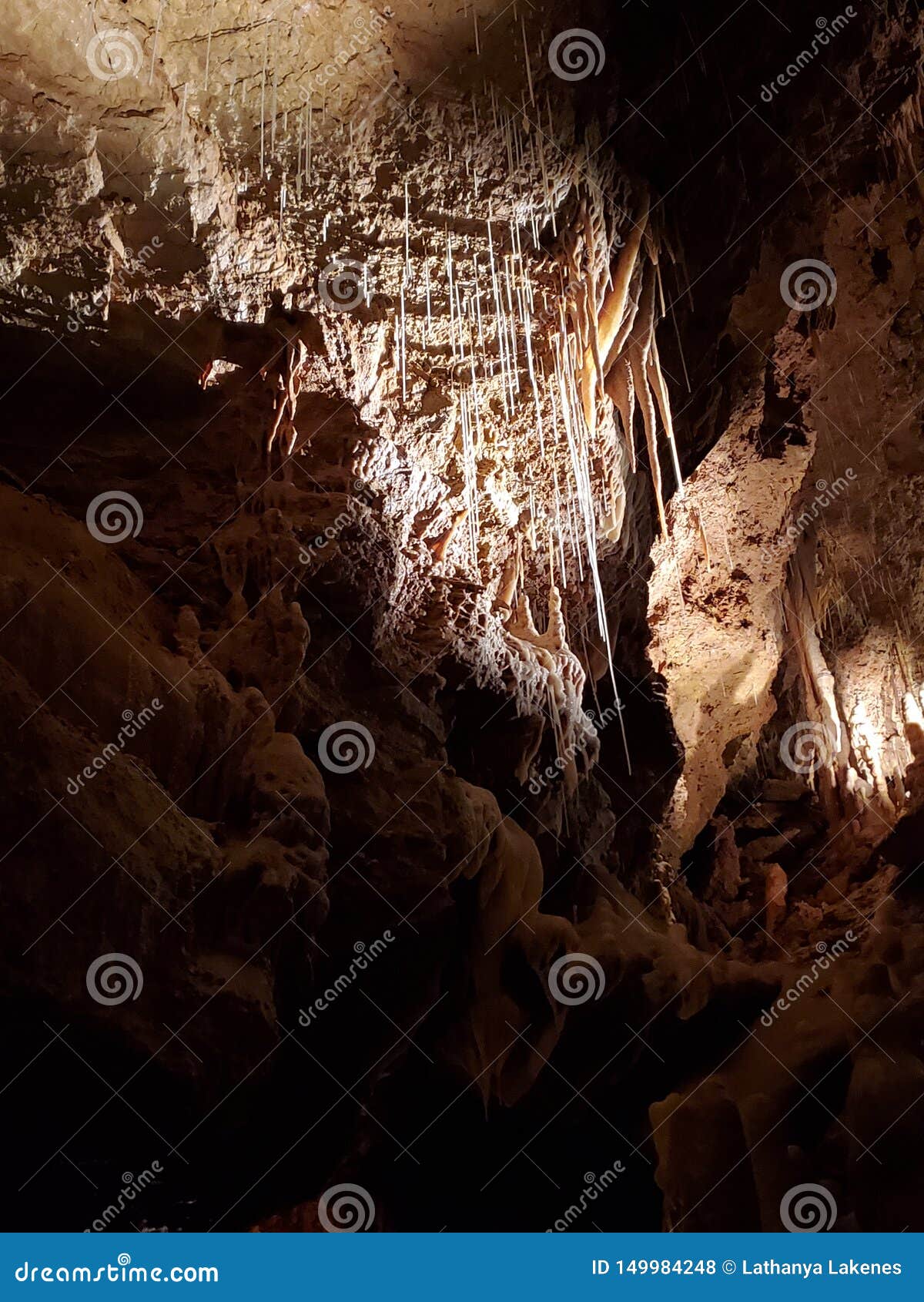 Lit up cave formations stock photo. Image of cavern - 149984248