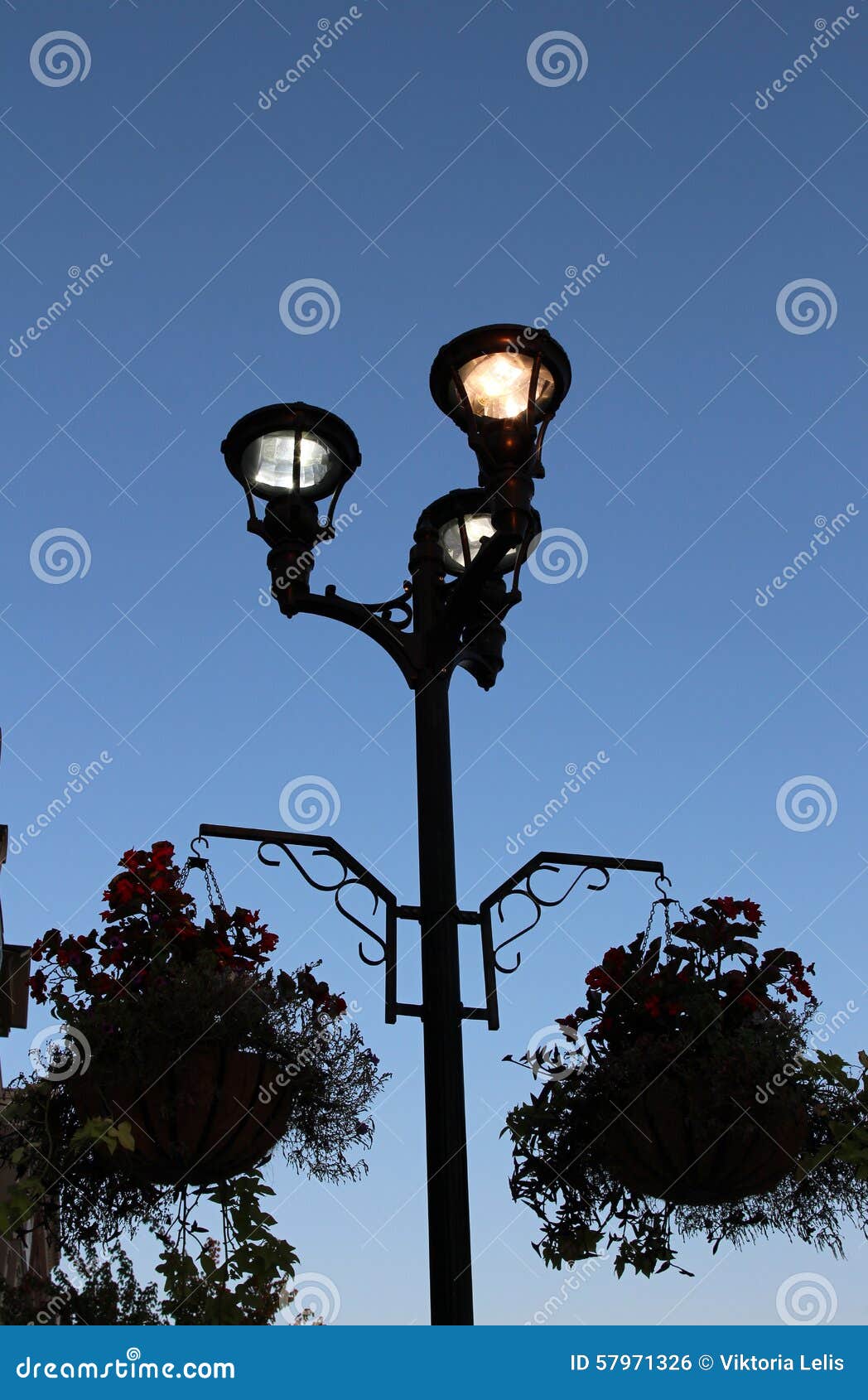 The lit up street lamp stock photo. Image of illumination - 57971326