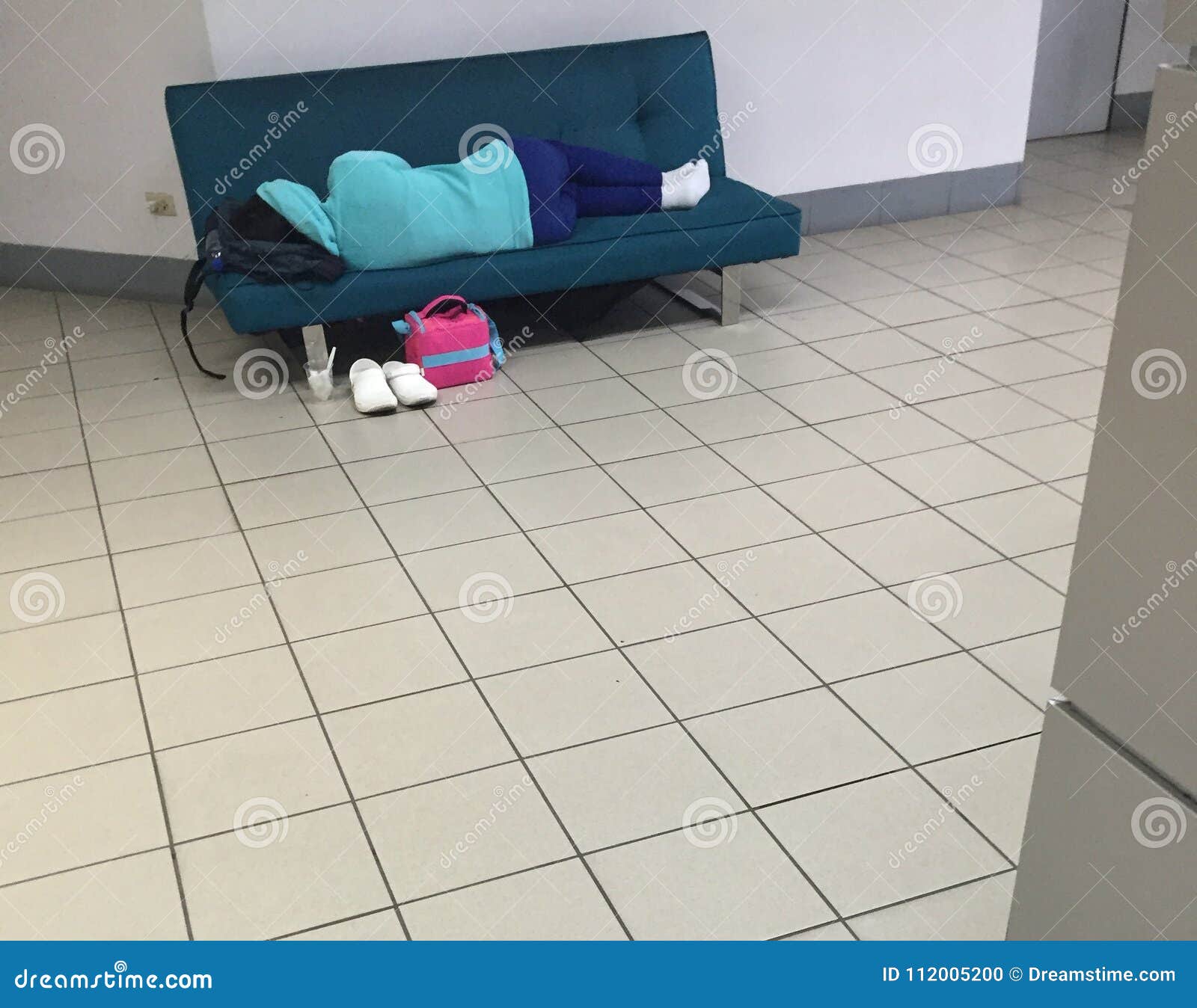 Student Sleeping on College Couch Stock Photo - Image of couch, women ...