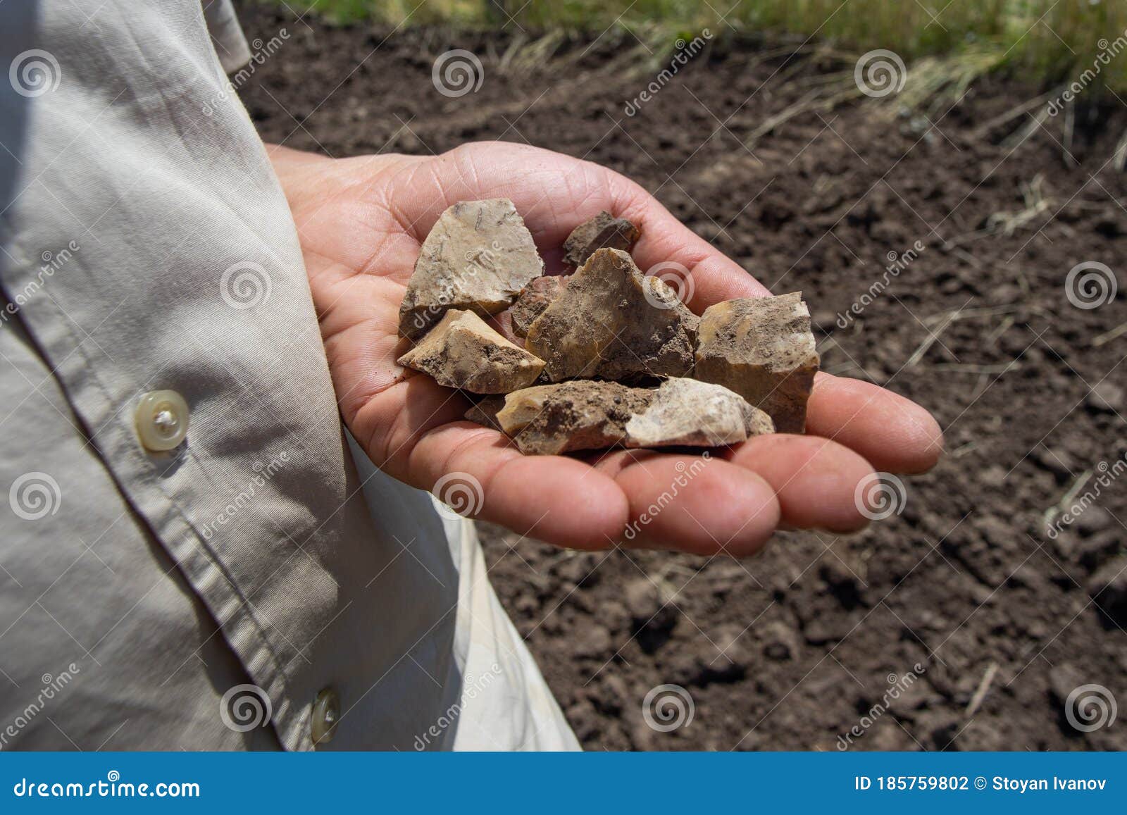 Lithic tools held in hand stock photo. Image of ancient - 185759802
