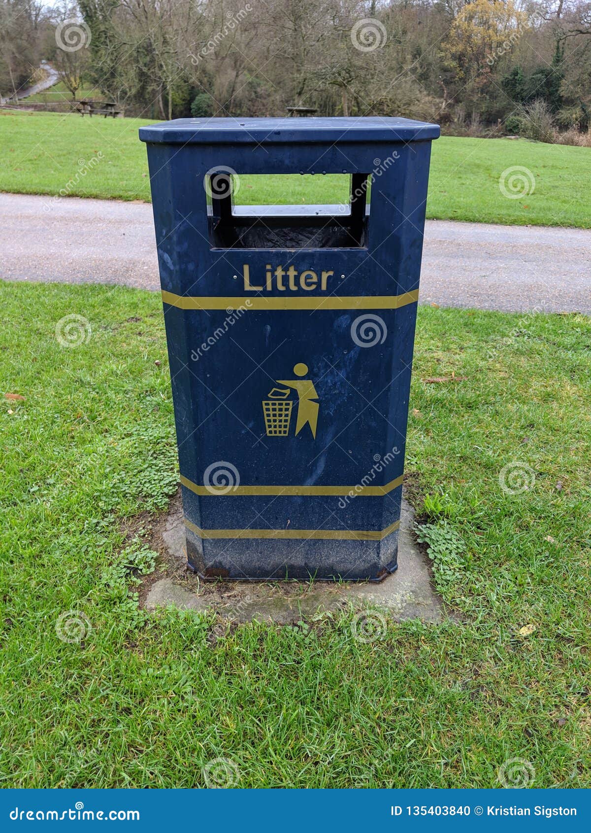 Litter Bin in Grassed Area in Front of Path Stock Photo - Image of ...