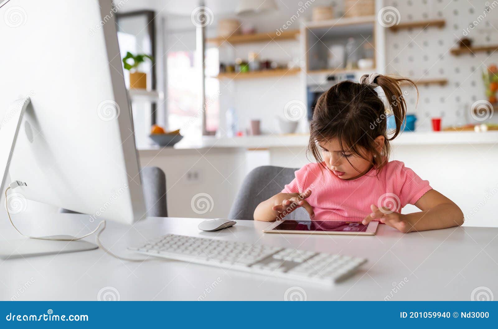 Little Addicted Child Playing with Technology Devices at Home Stock ...