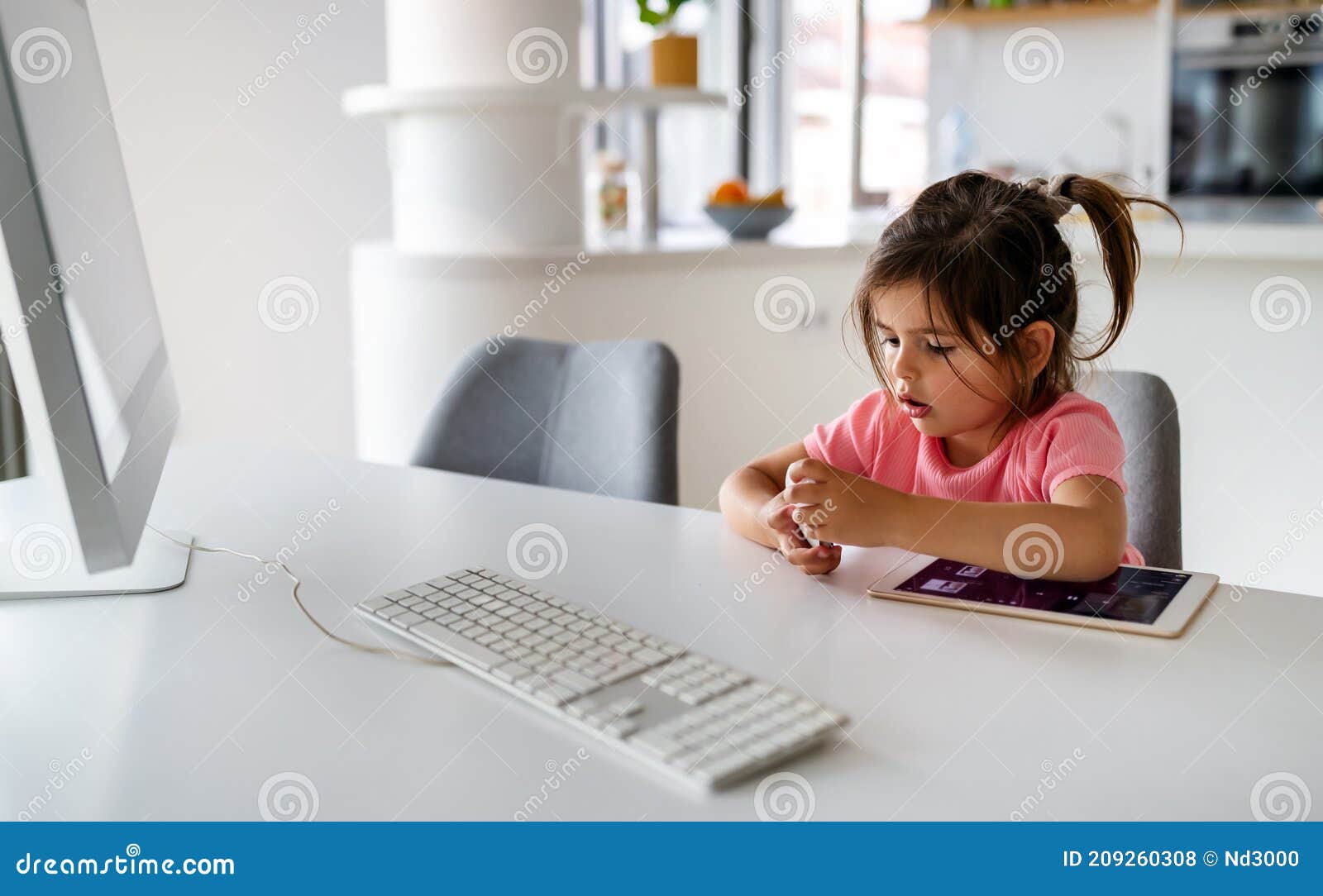 Little Addicted Child Playing with Technology Devices at Home Stock ...