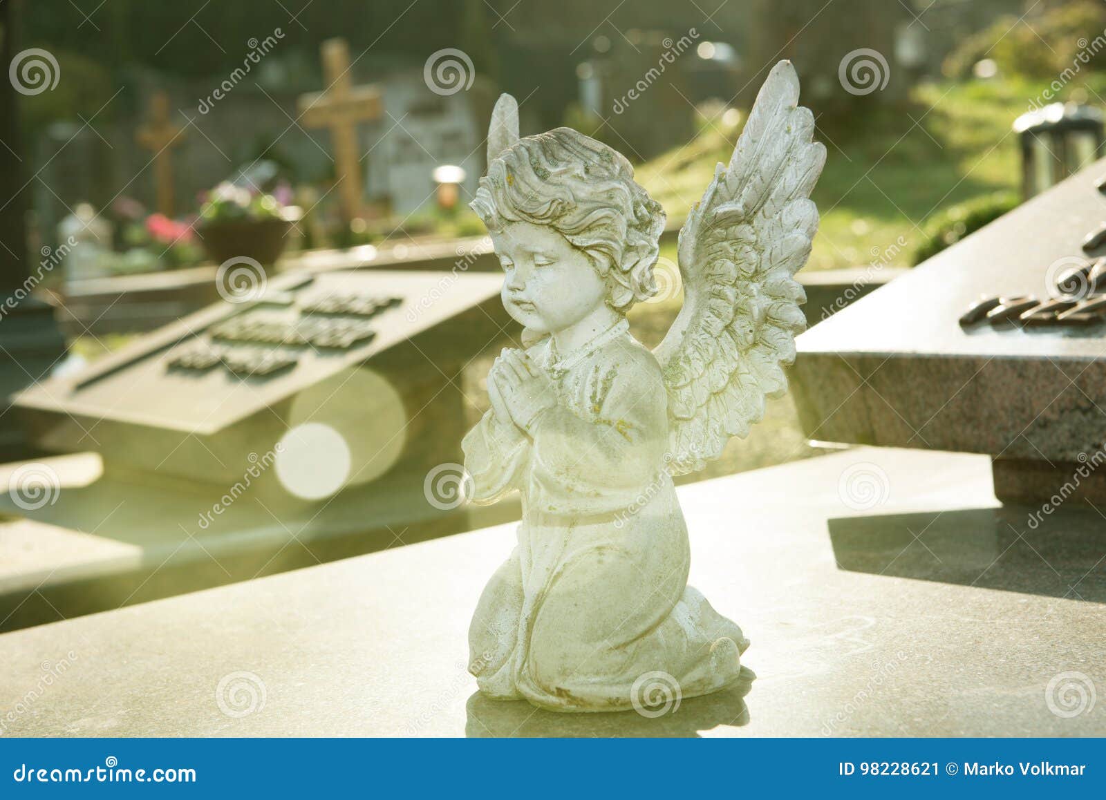 Little angel on grave stock image. Image of cross, grief - 98228621