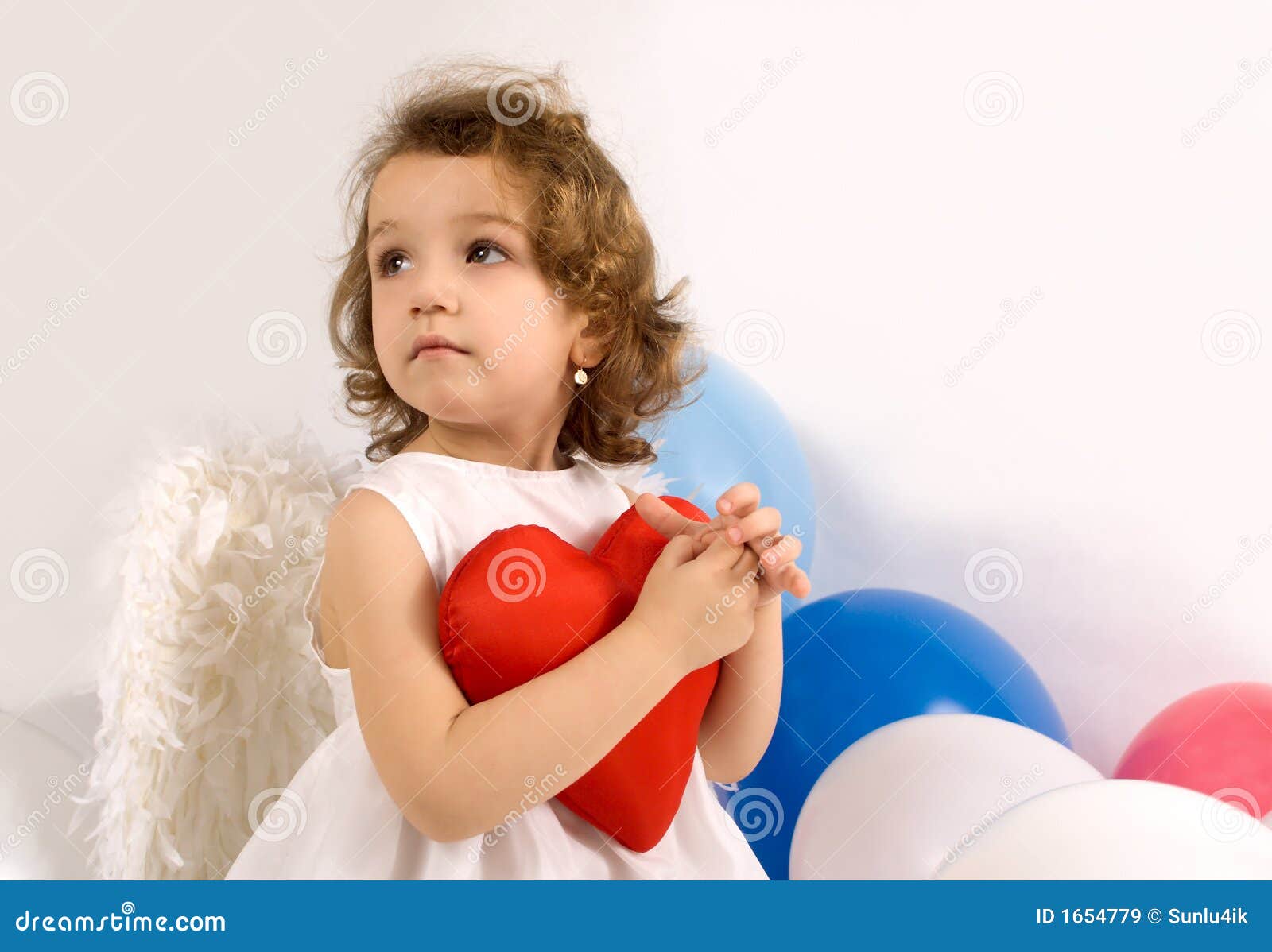 A Little Angel with Red Heart Stock Image - Image of childhood, fairies ...