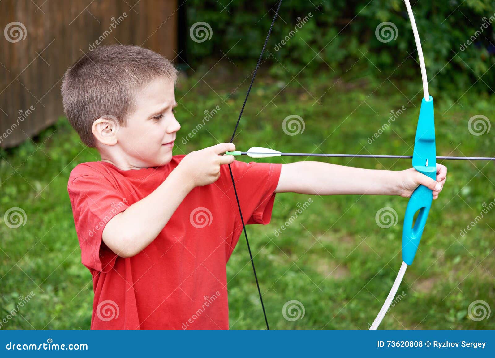 Little Archer with Bow and Arrow Stock Photo - Image of training ...