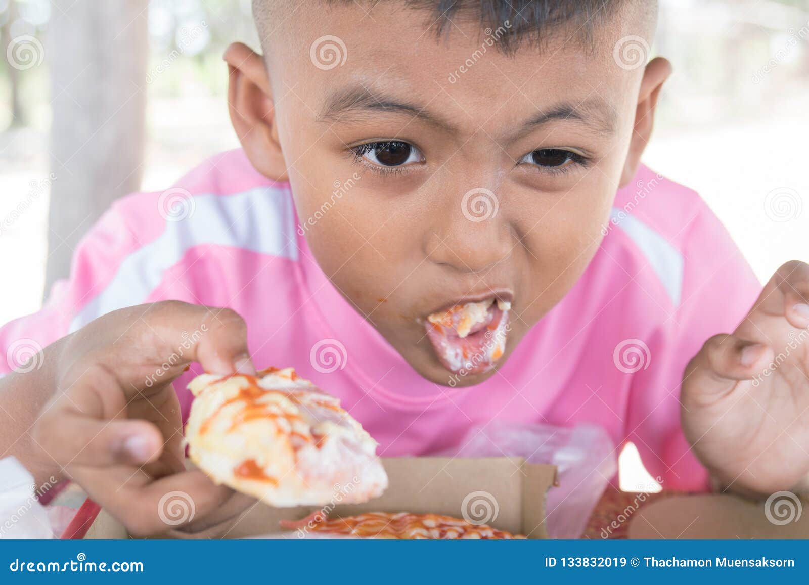 Cute Little Asian Boy Eating Snack Stock Image - Image of little ...