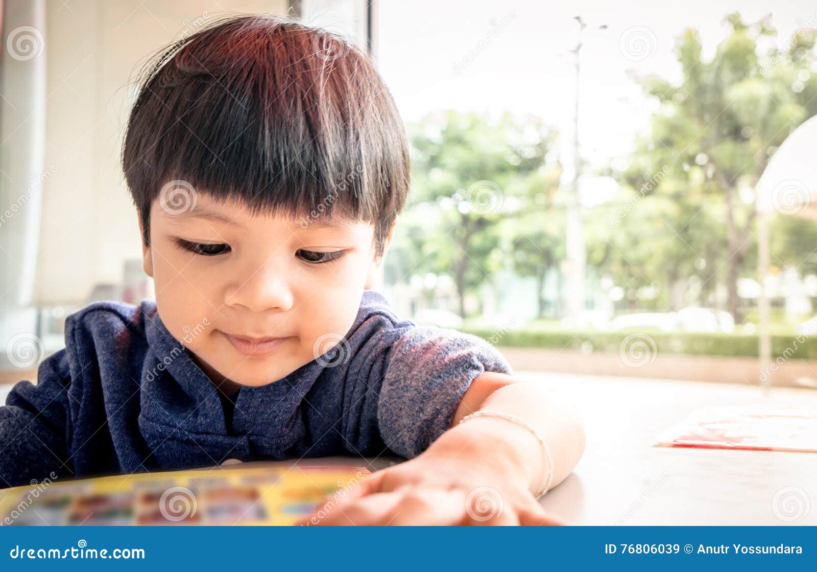 Little Asian Boy is Reading a Book Stock Image - Image of school, small ...