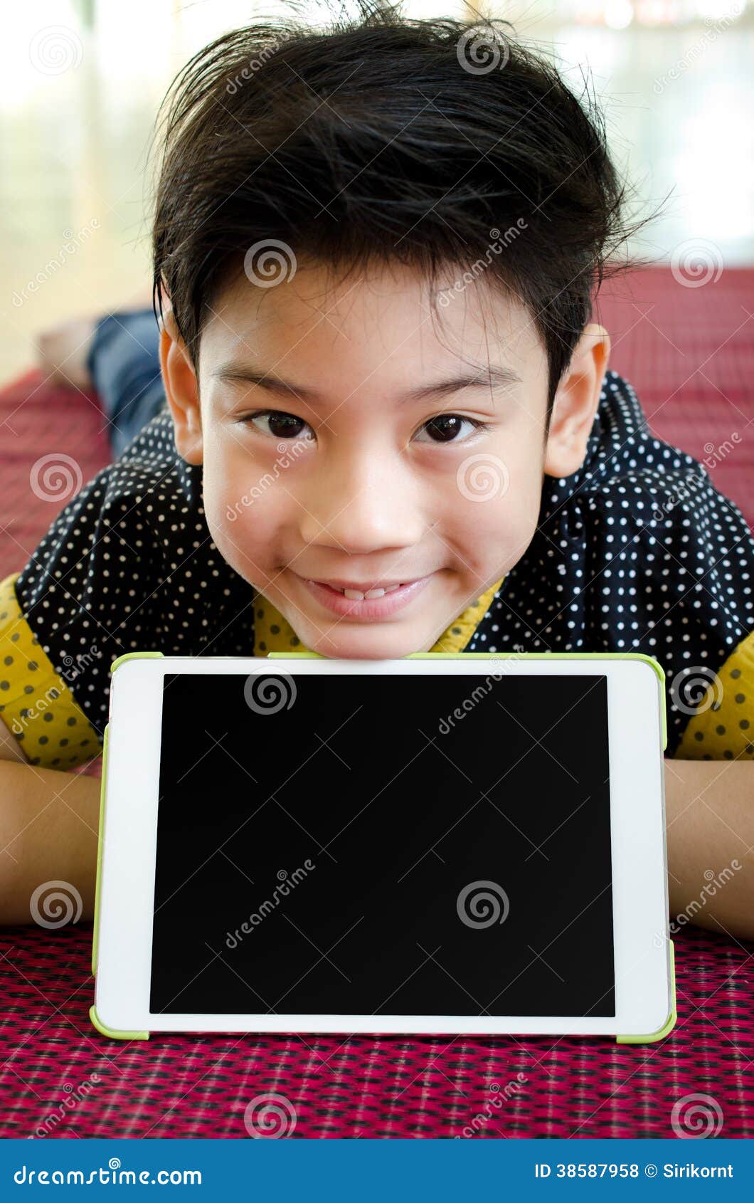 Little Asian Boy Smiles with Tablet Computer Acting on His Face Stock ...