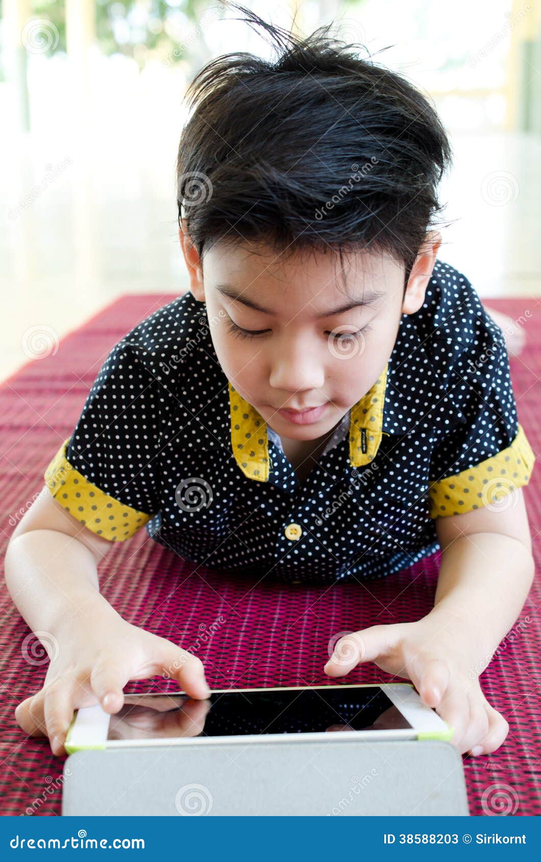 Little Asian Boy Smiles with Tablet Computer Acting on His Face Stock ...