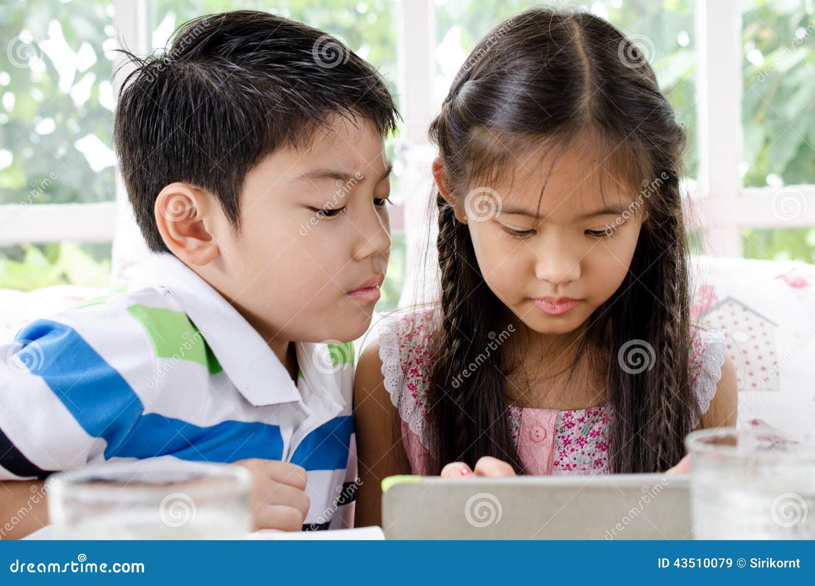 Little Asian Girl and Boy with Tablet Computer Stock Image - Image of ...