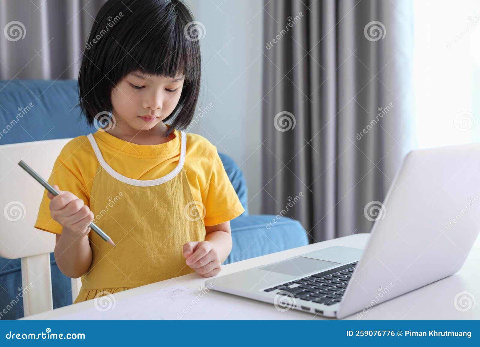 Little Asian Girl Student Study Online Using Laptop Computer at Home ...
