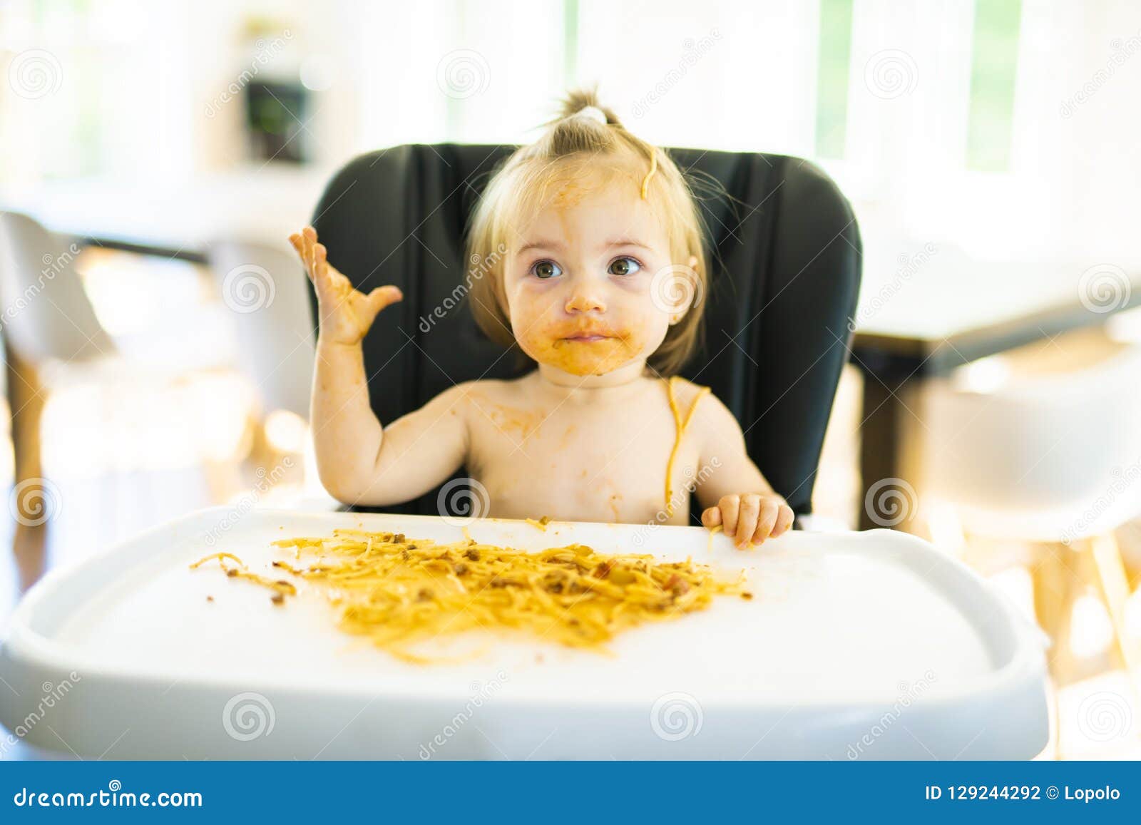 Little B Eating Her Dinner and Making a Mess Stock Photo - Image of ...