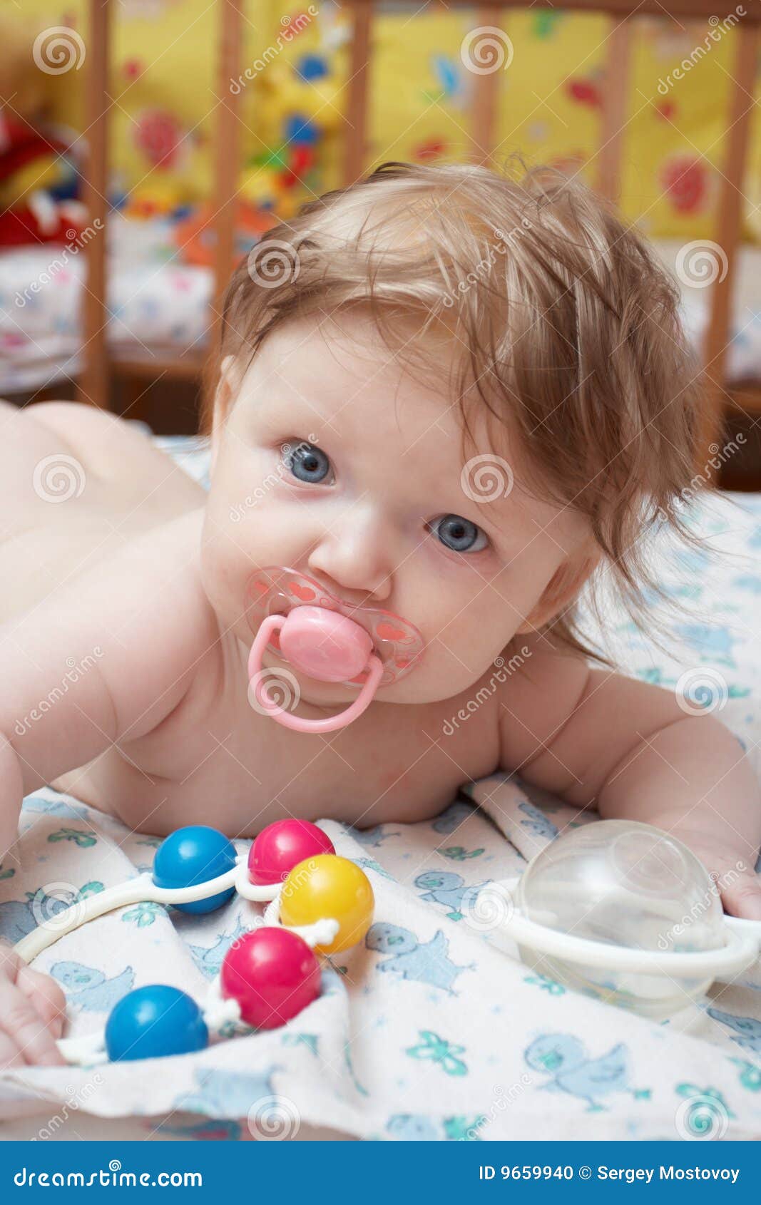 Little baby stock photo. Image of rattle, pacifier, girl - 9659940