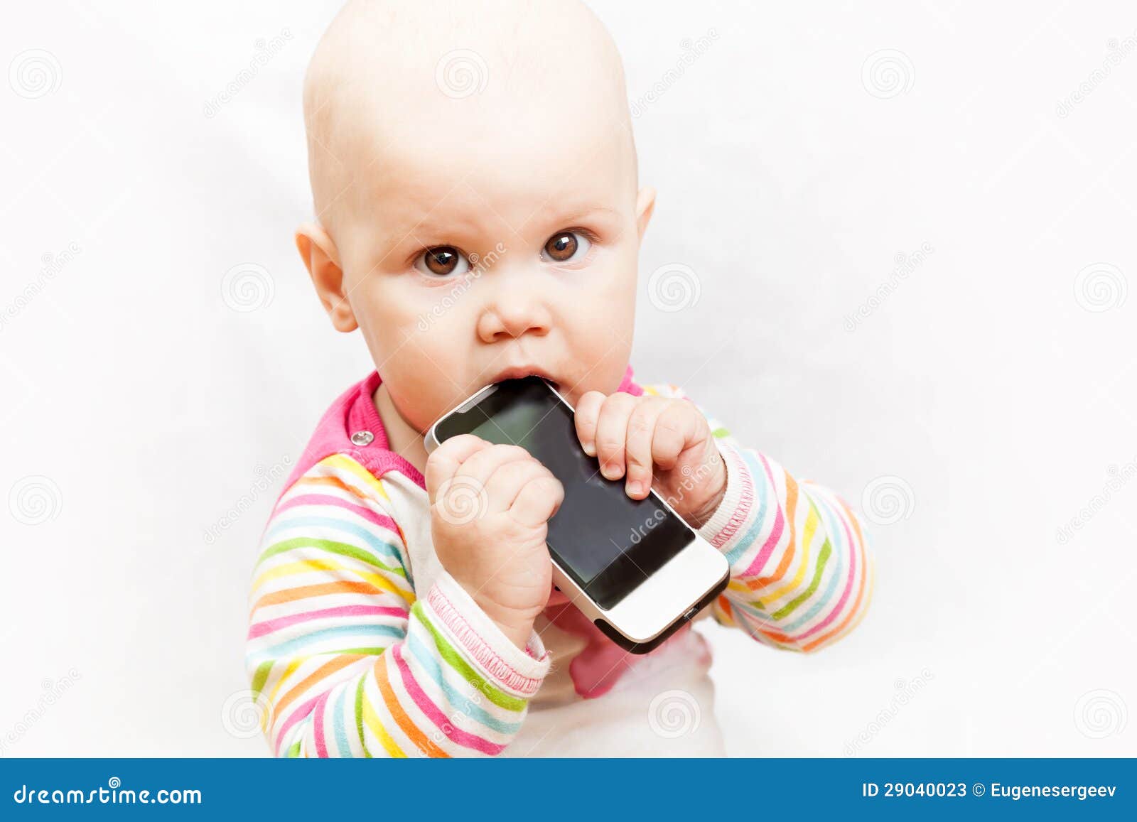 Little Baby Baby Chews on a Mobile Phone Stock Image - Image of nice ...