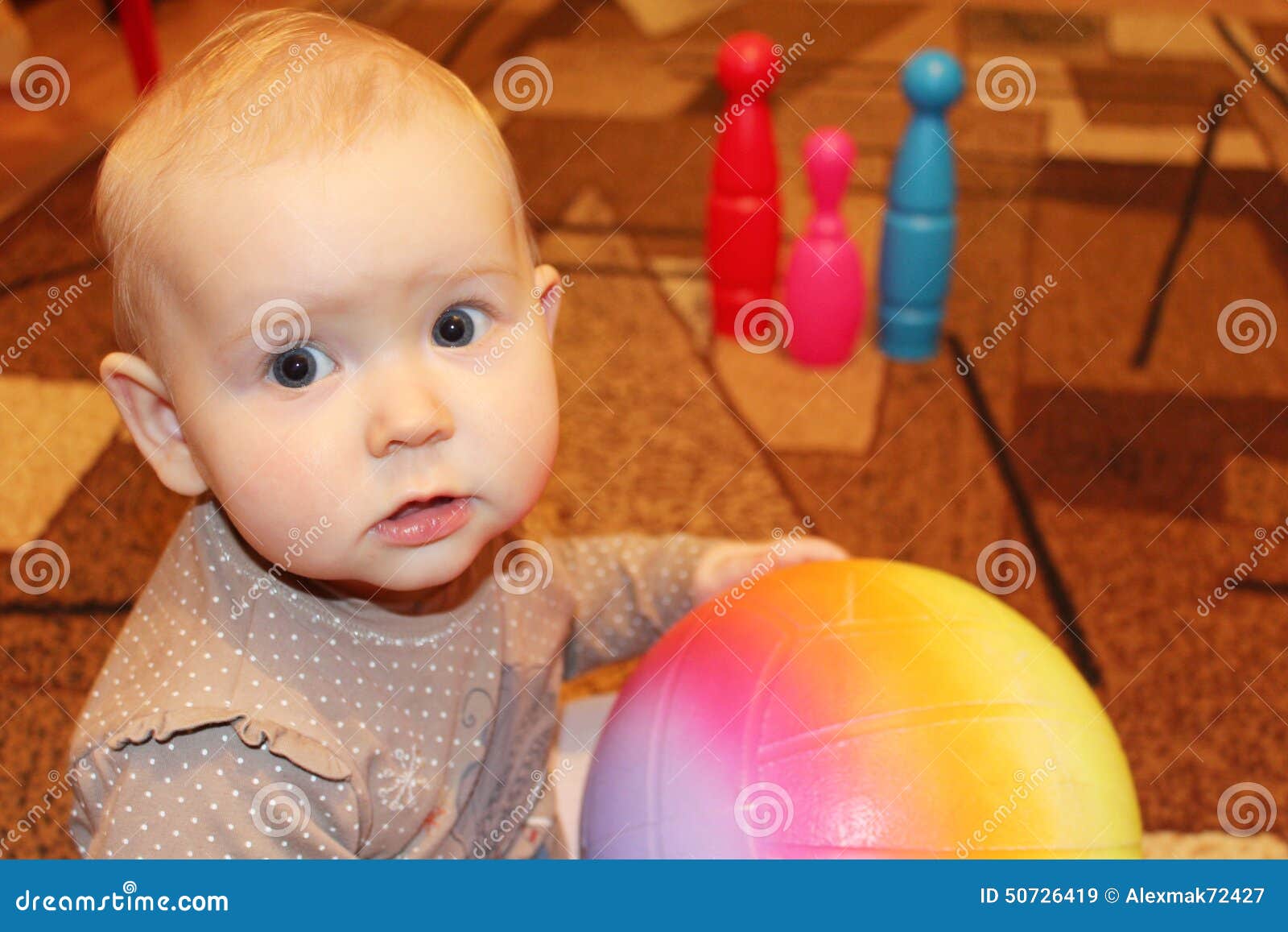 Little Baby with a Ball in Perplexity Stock Image - Image of indoors ...