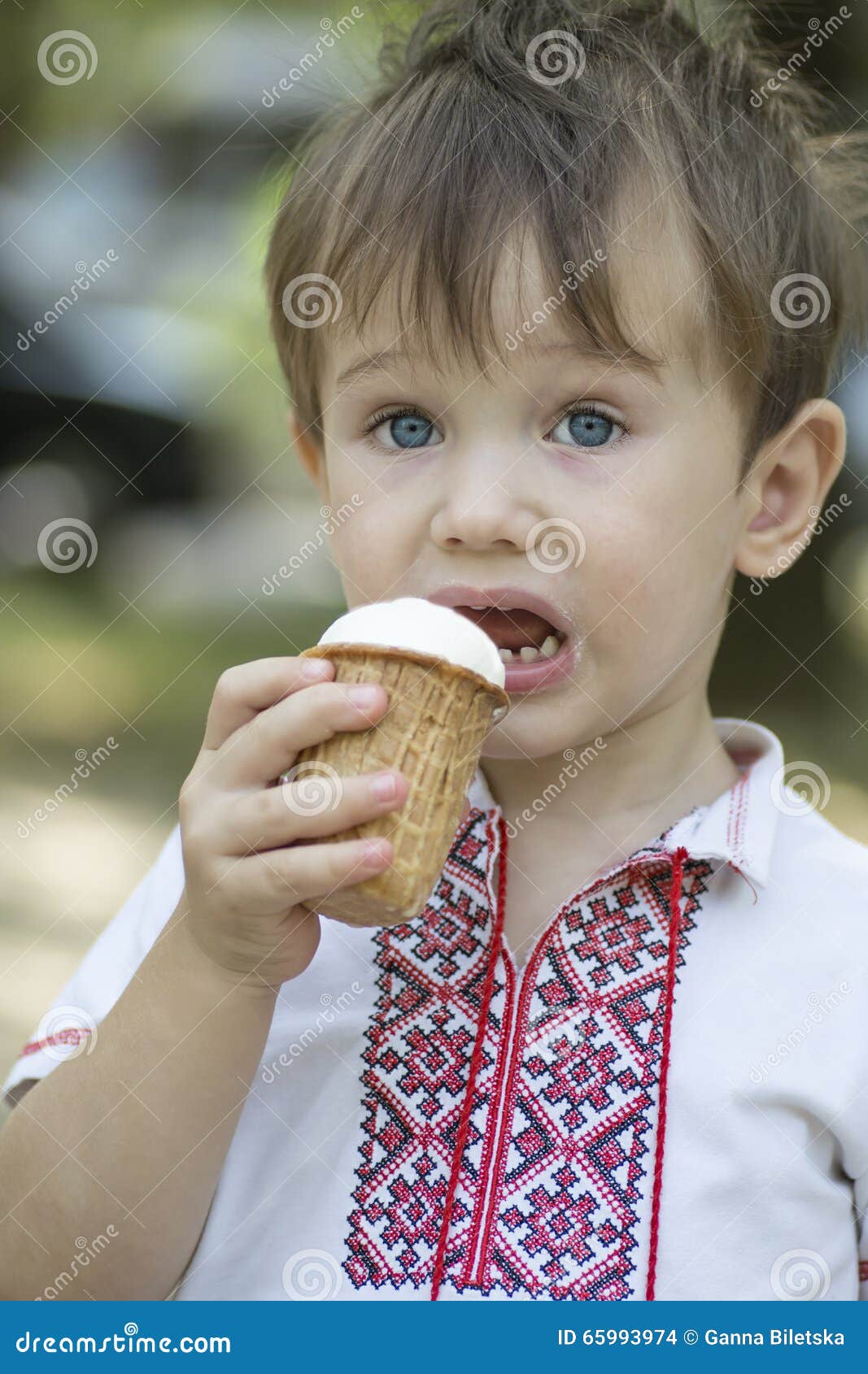 Little Baby with Big Blue Eyes Eats Ice Cream Stock Photo - Image of ...