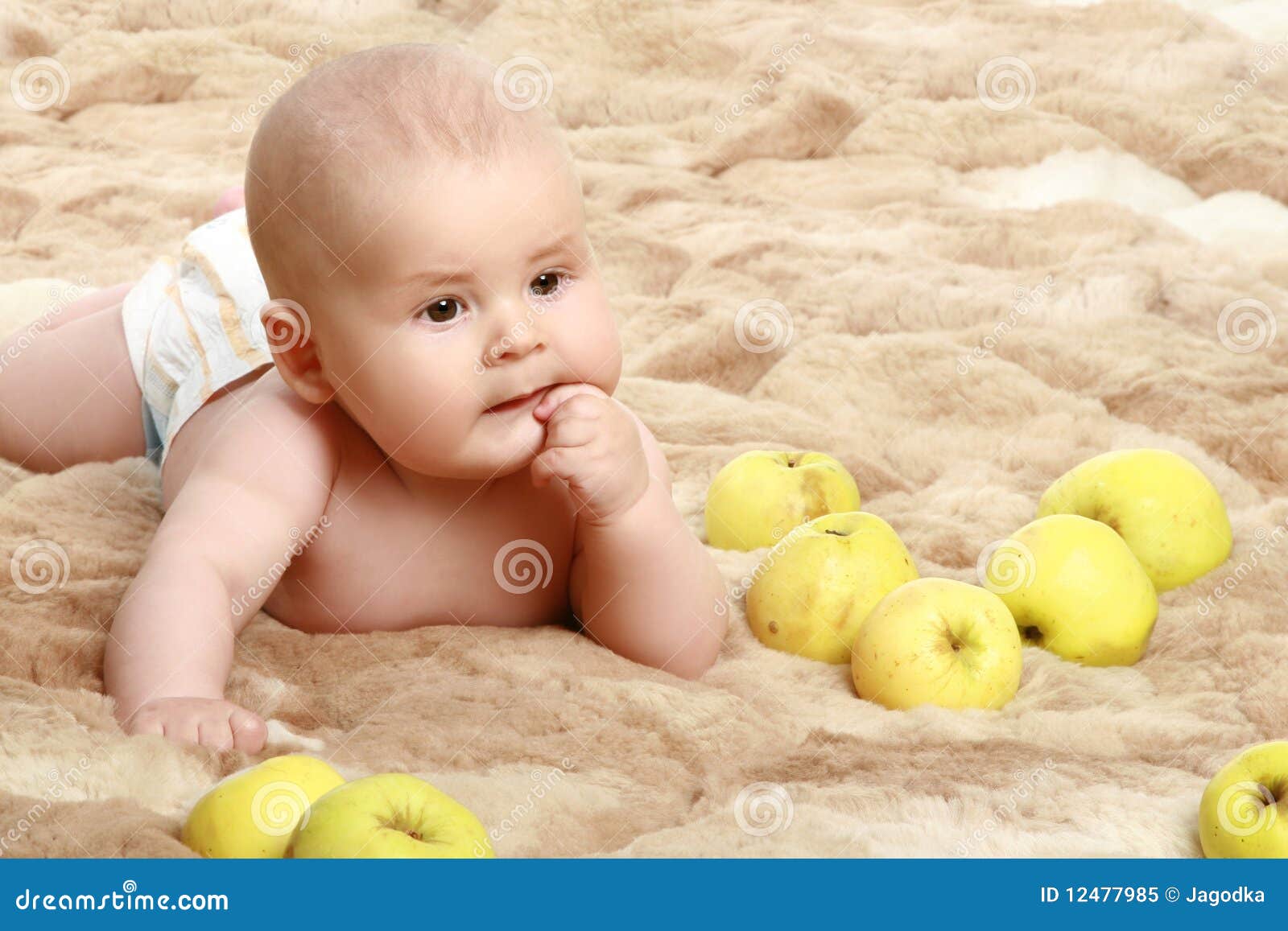 Little baby boy in apples stock image. Image of child - 12477985