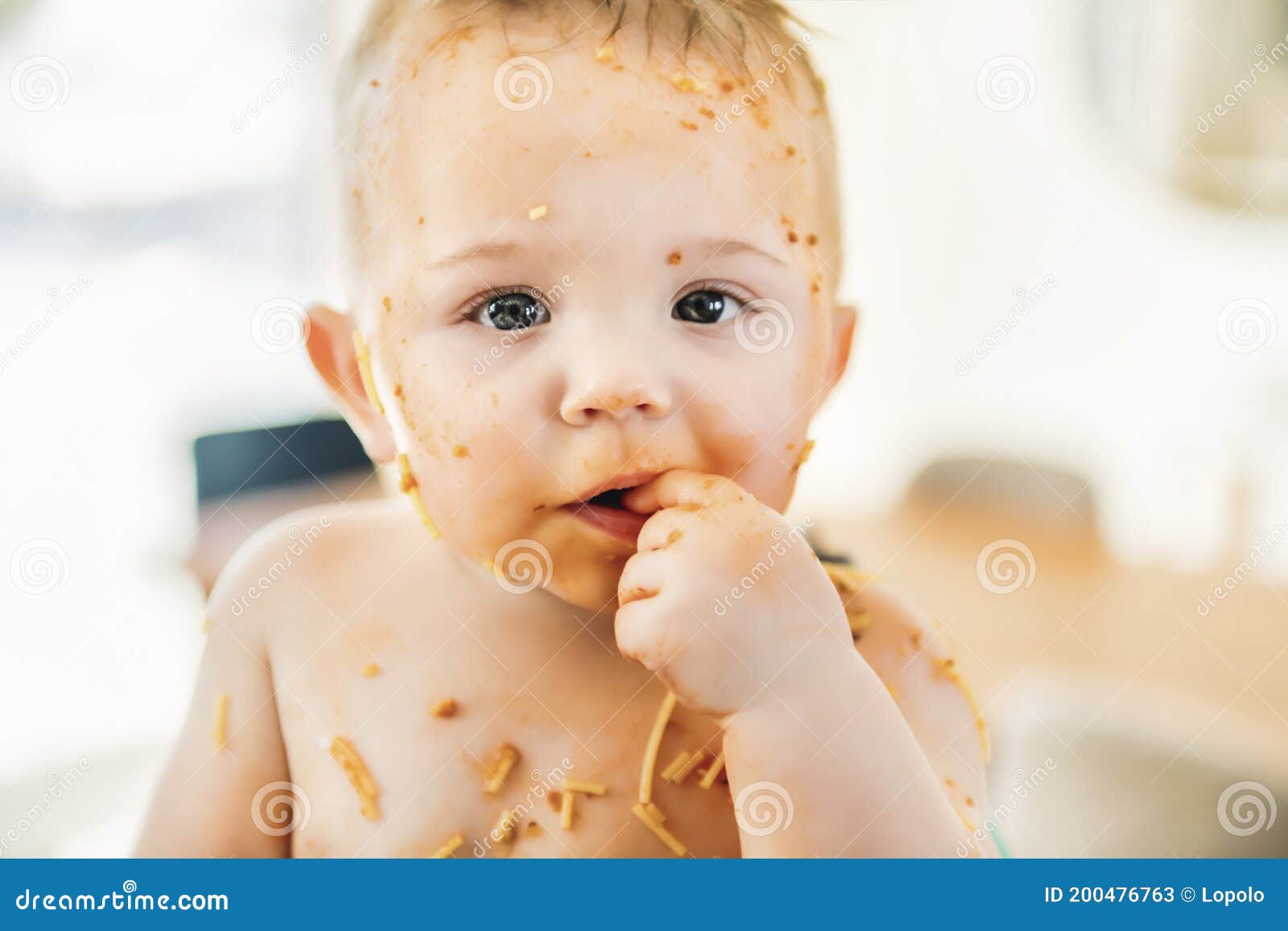 Little Baby Boy Eating Her Dinner and Making a Mess Stock Image - Image ...