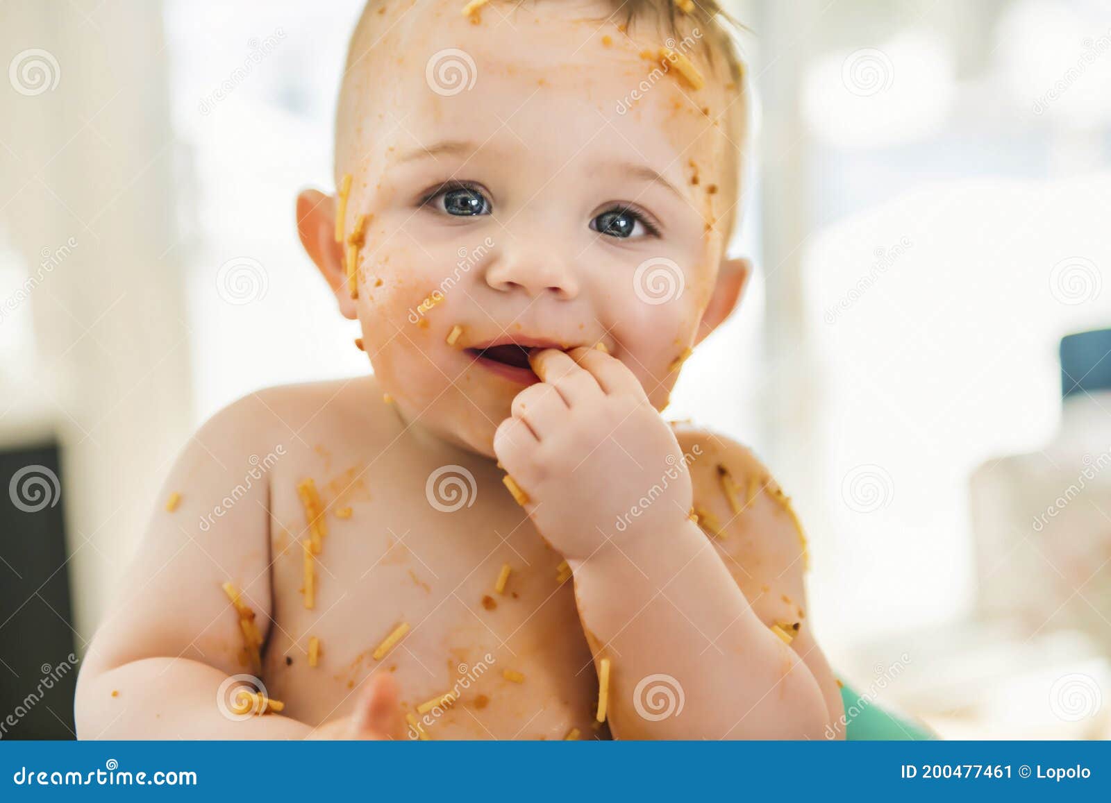 Little Baby Boy Eating Her Dinner and Making a Mess Stock Image - Image ...
