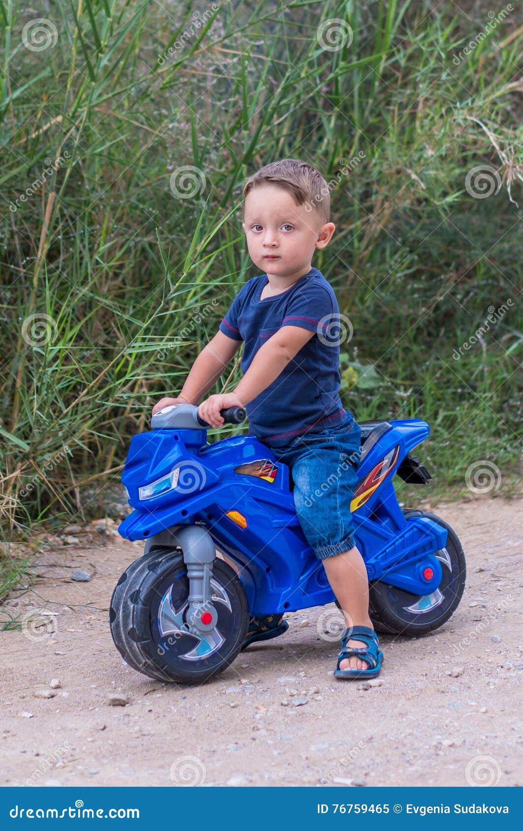 Little Baby Boy Riding Motobike Stock Image - Image of clothes, hands ...
