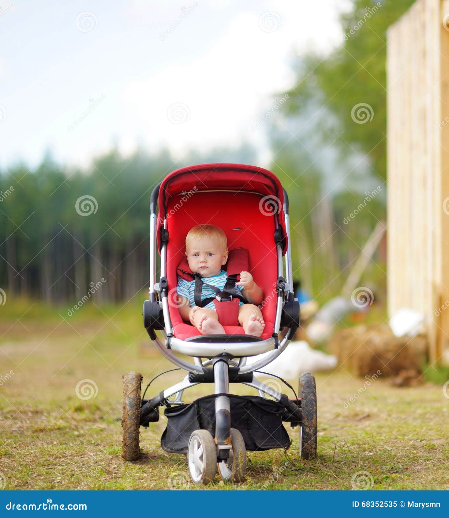 Little Baby Boy in Stroller Stock Image - Image of foot, child: 68352535
