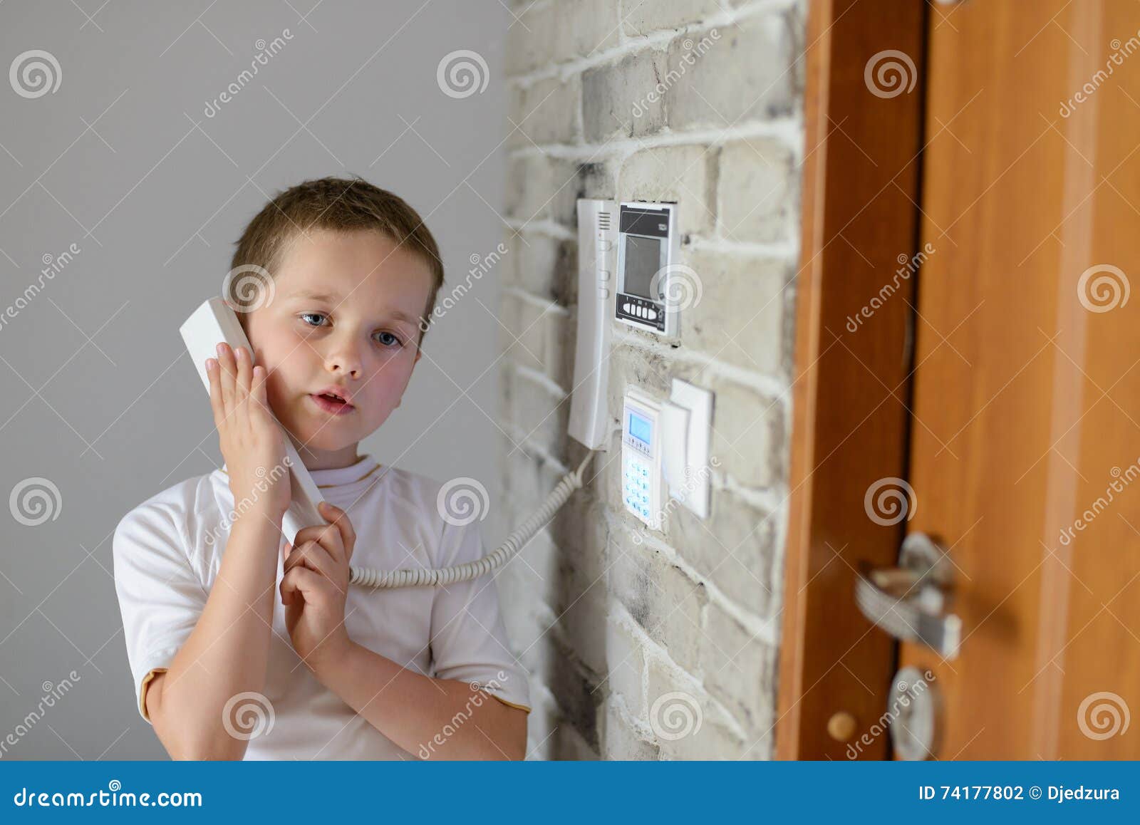 Little Baby Boy Talking on Intercom Stock Photo - Image of modern ...