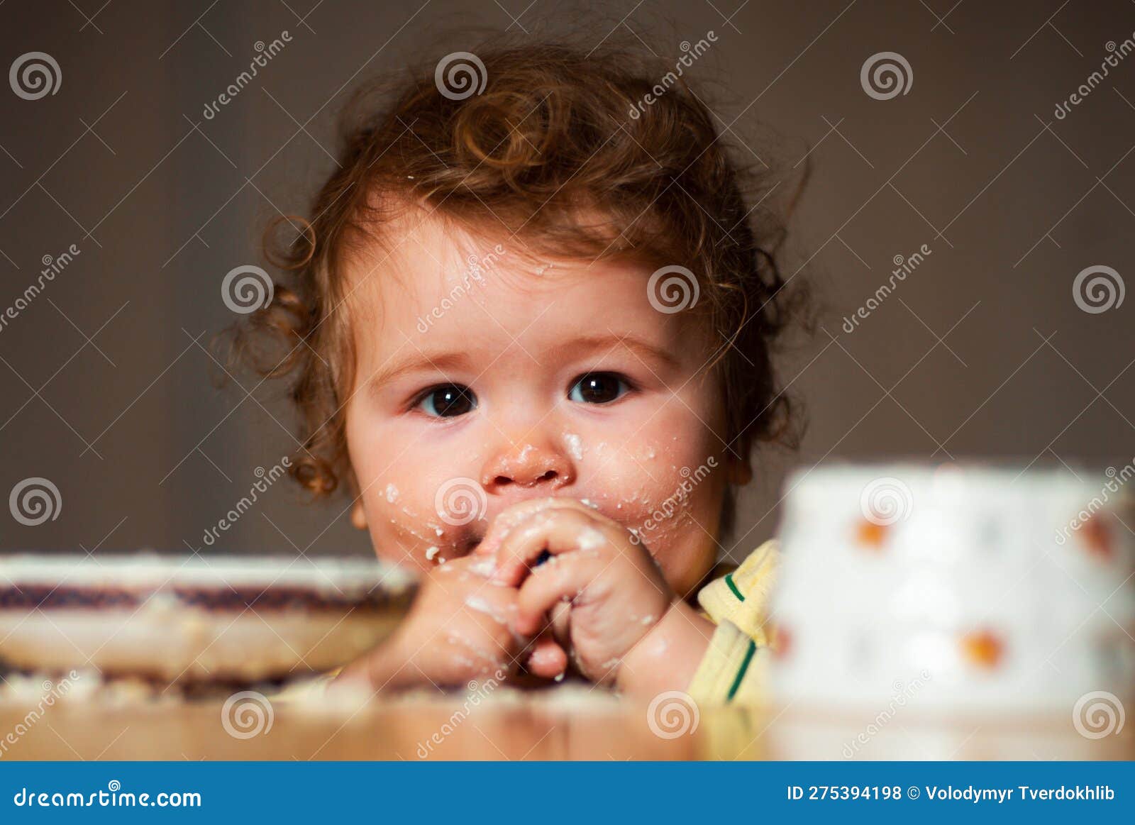 Little Baby are Eating. Little Child Eating Fruit Puree. Stock Photo ...