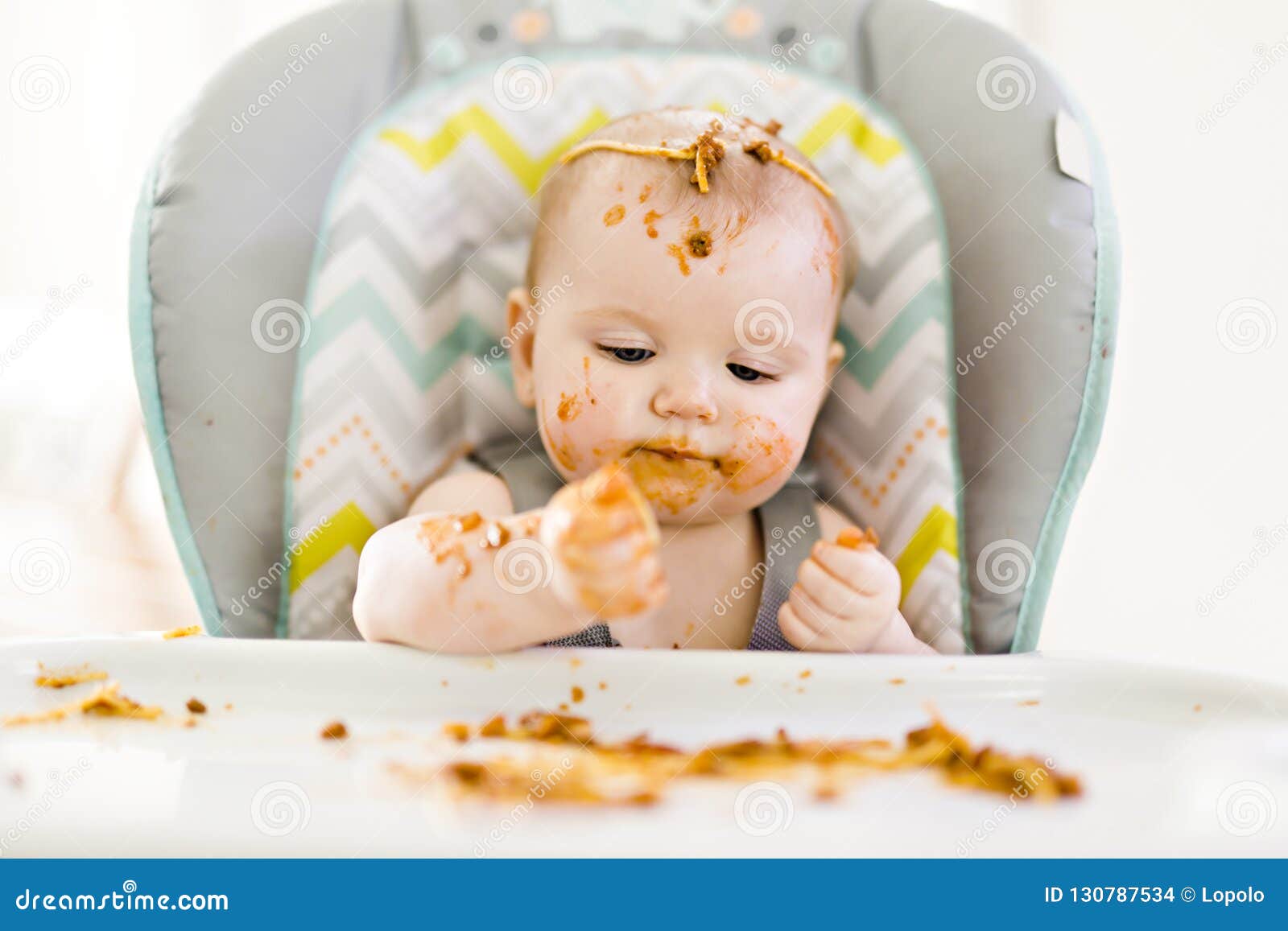 Little Baby Eating Her Dinner and Making a Mess Stock Photo - Image of ...