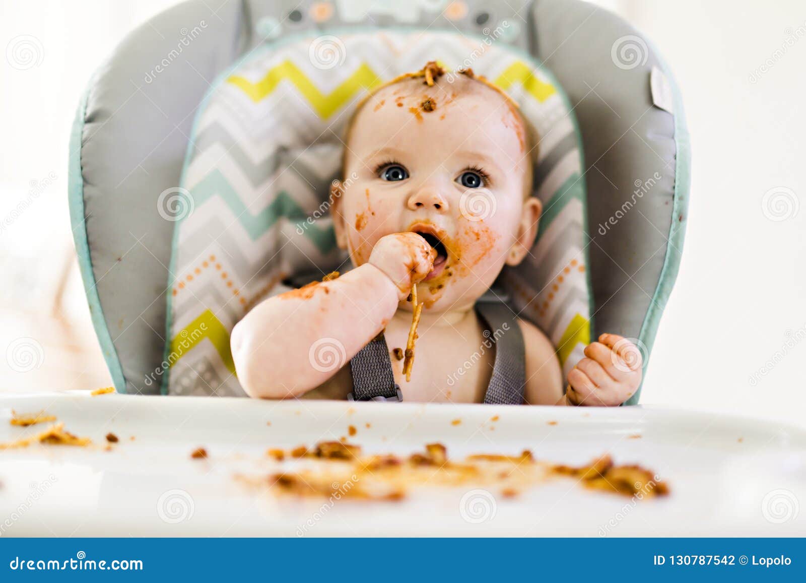 Little Baby Eating Her Dinner and Making a Mess Stock Photo - Image of ...